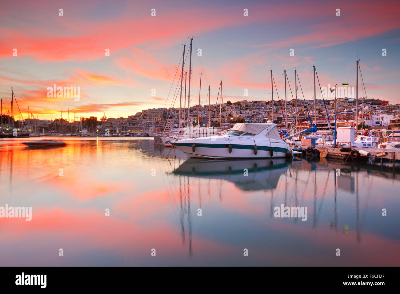 Boats mooring at a pier in Mikrolimano marina in Athens, Greece Stock ...