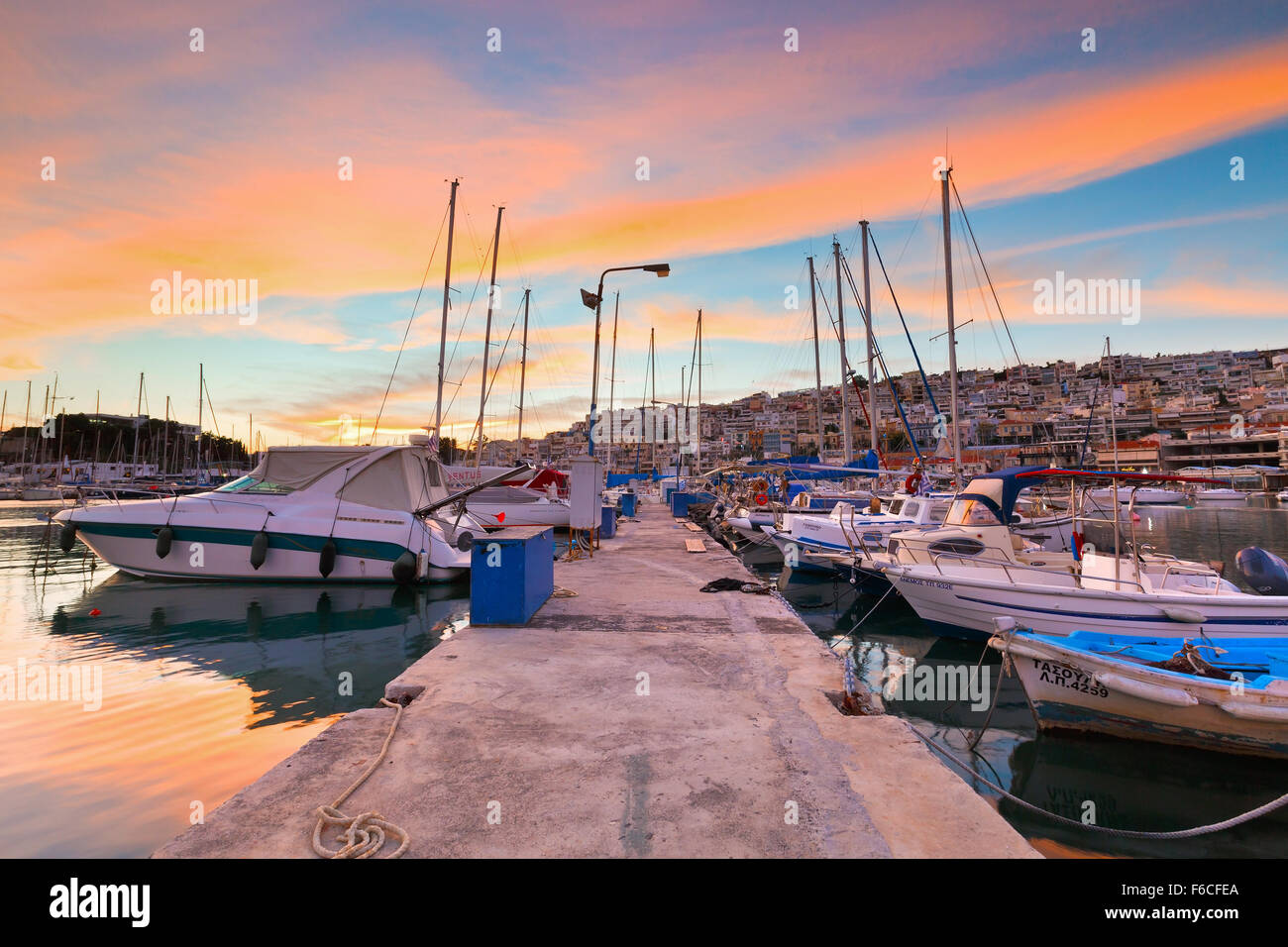 Boats mooring at a pier in Mikrolimano marina in Athens, Greece Stock ...