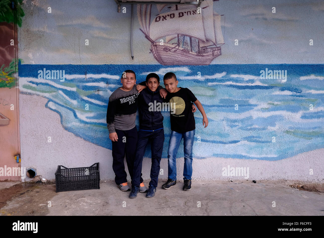 Israeli Arab children posing in the mixed Israeli-Arab city of Lod ...