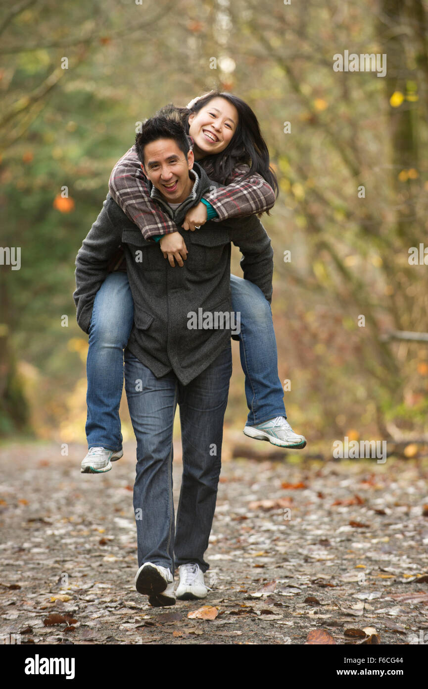Piggy backing carrying hi-res stock photography and images - Alamy