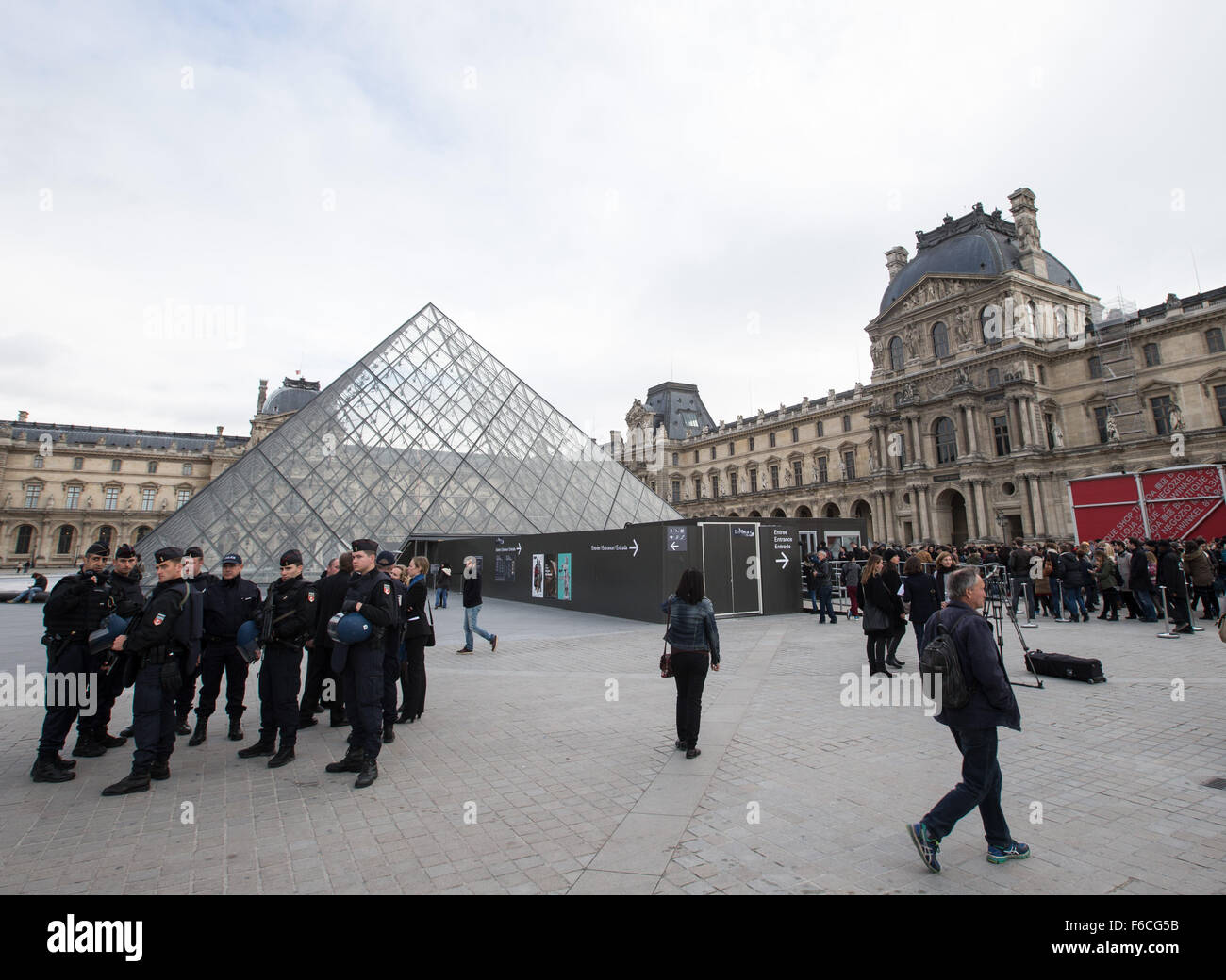 Paris, France. 16th Nov, 2015. Police patrol in front of the Louvre ...