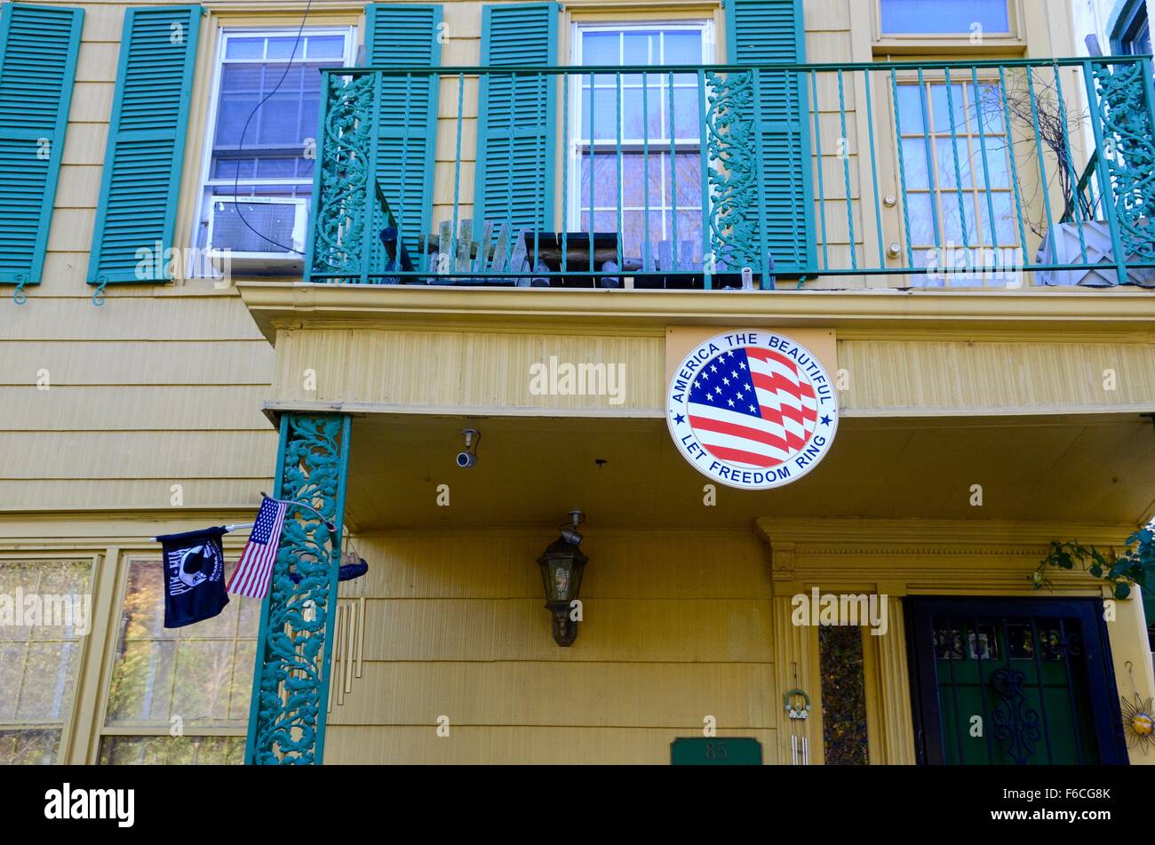 america the beautiful let freedom ring sign on yellow wooden house with ...