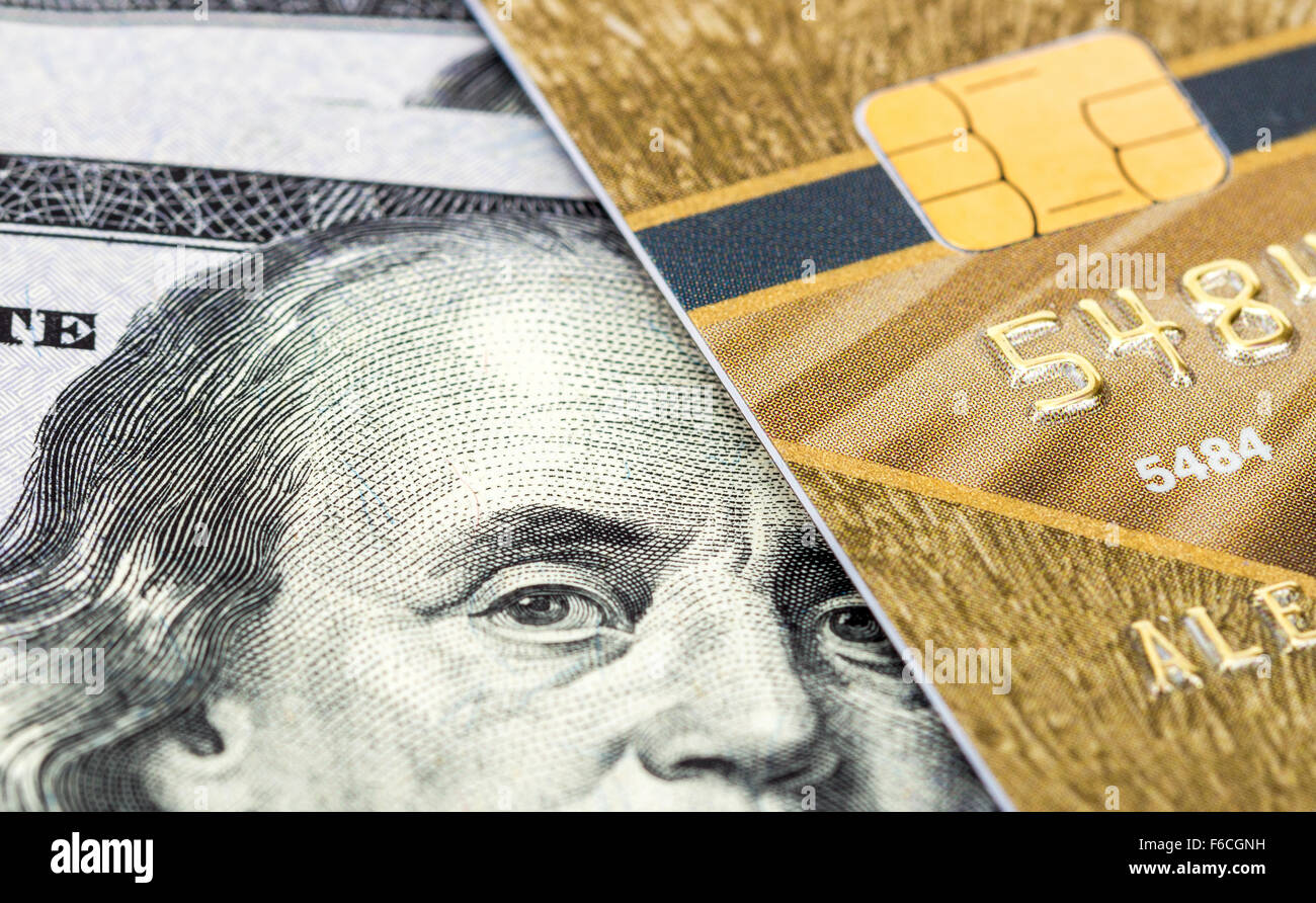 Mastercard Debit Card with US dollar bills Stock Photo - Alamy