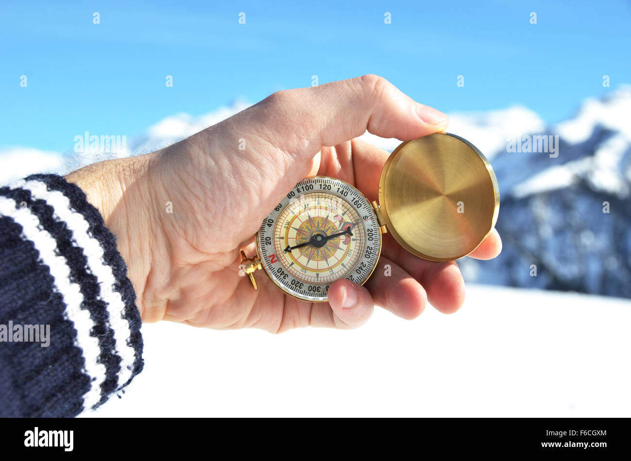 Compass in the hand Stock Photo - Alamy