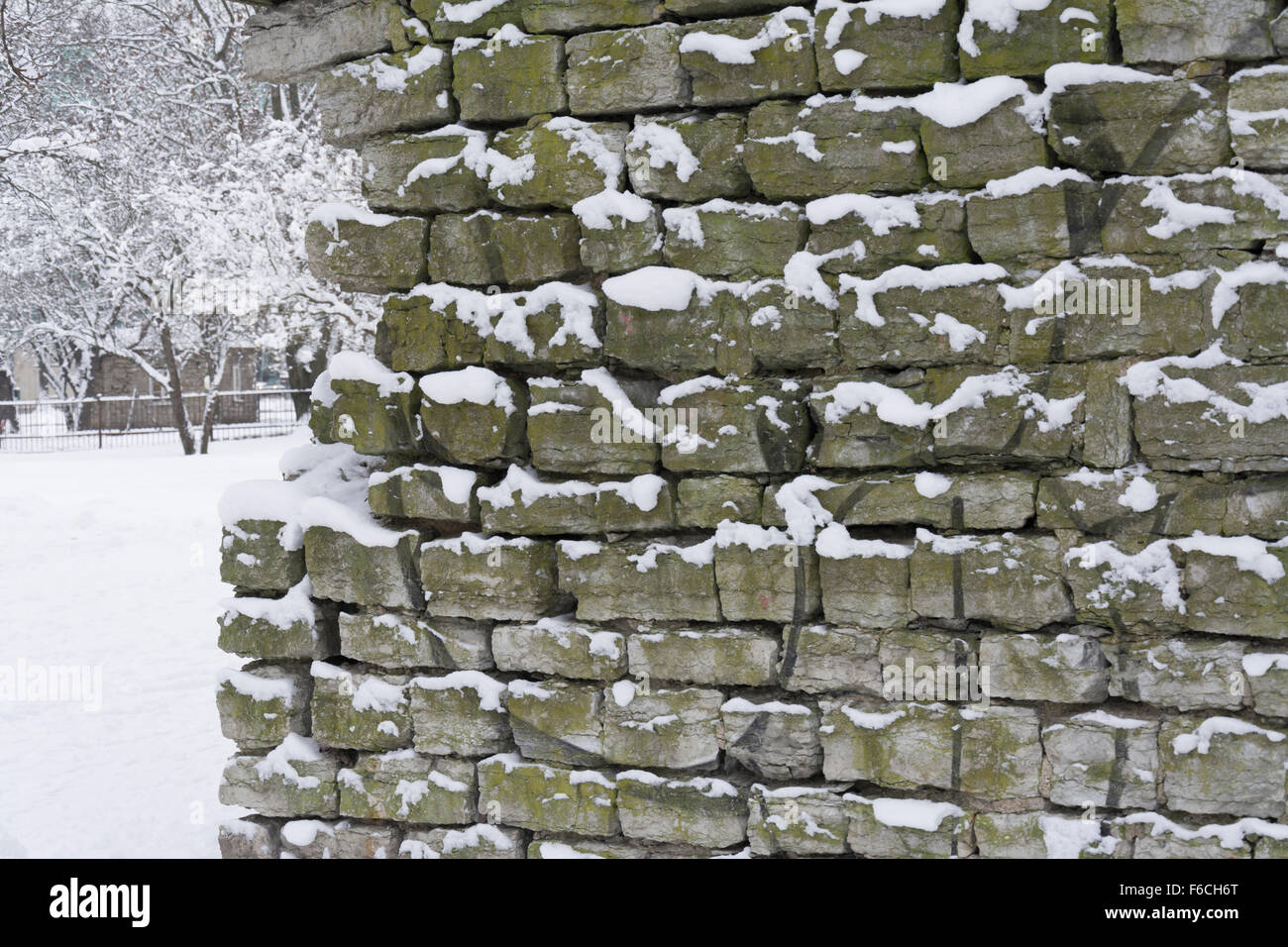 Winter Snow Stone Wall Stock Photos & Winter Snow Stone Wall Stock ...