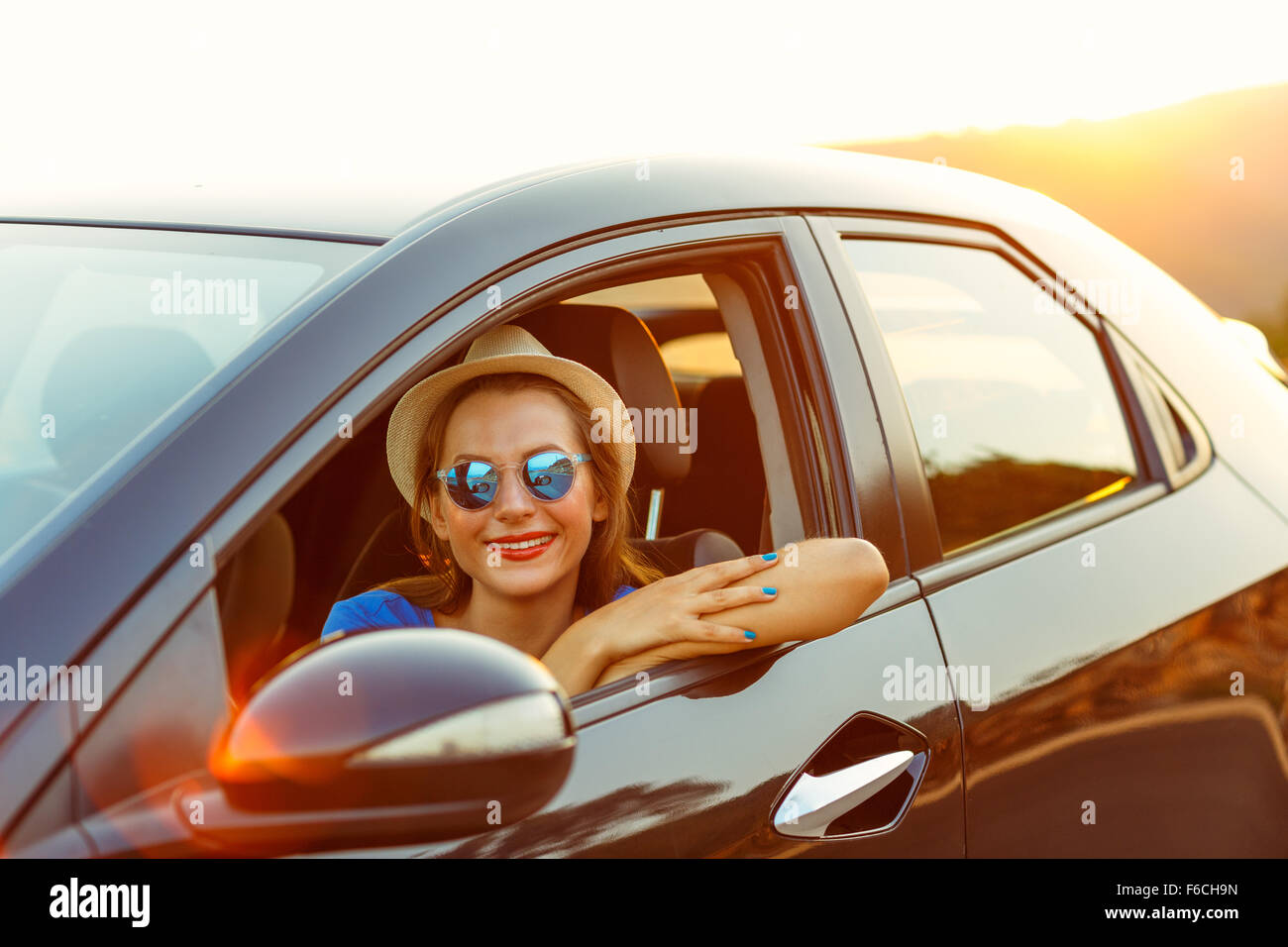 Person smiling while driving hi-res stock photography and images - Alamy