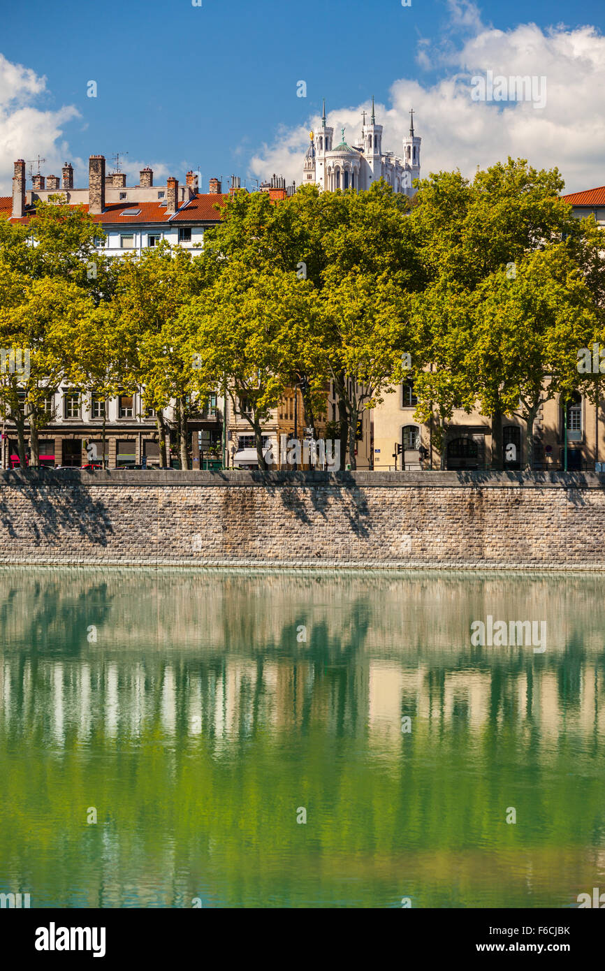 Cityscape of Lyon, France with reflections in the water. Bright sunny ...