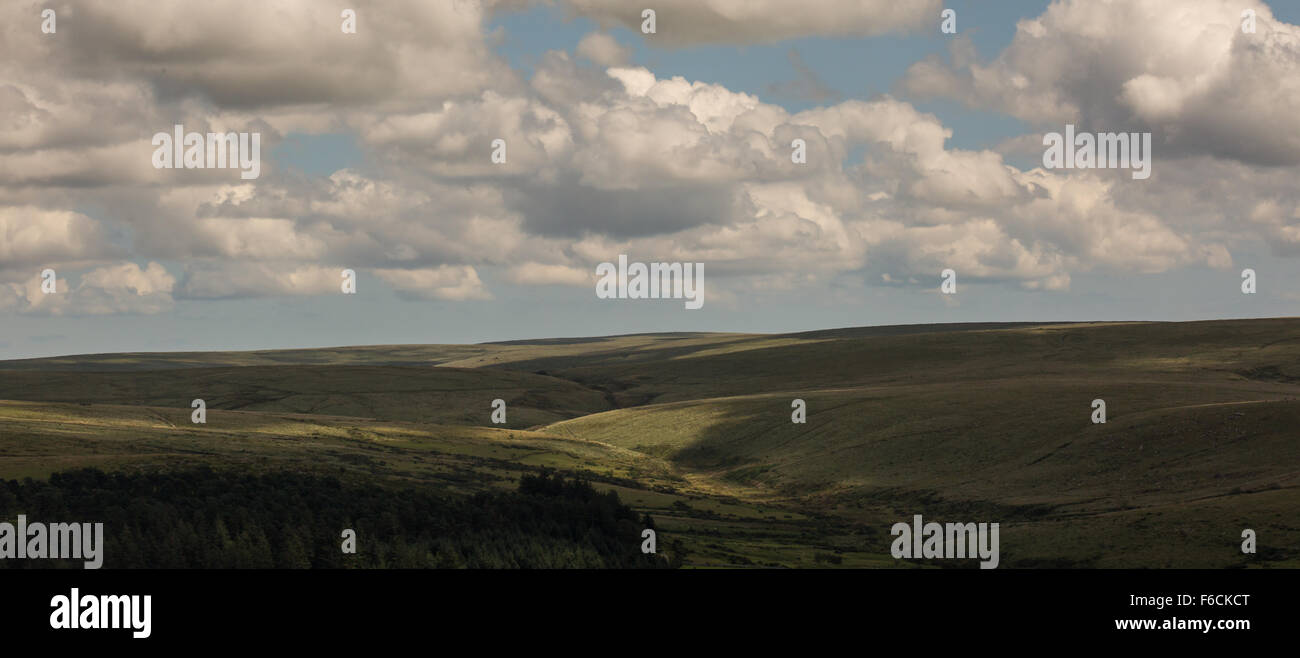 Rolling hills with dappled sunlight Stock Photo - Alamy
