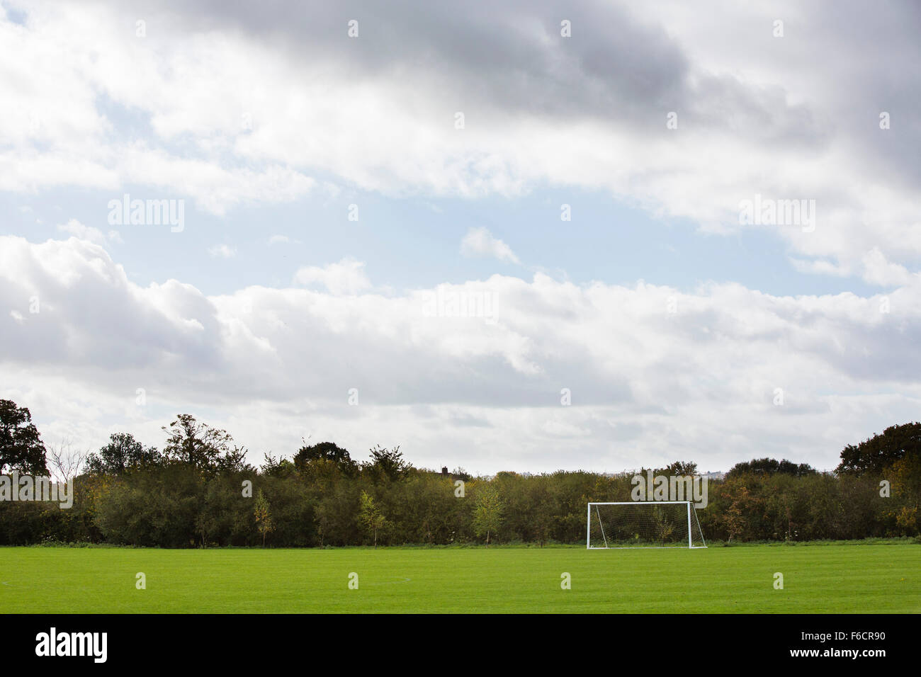 A single goal on an empty sports field Stock Photo - Alamy