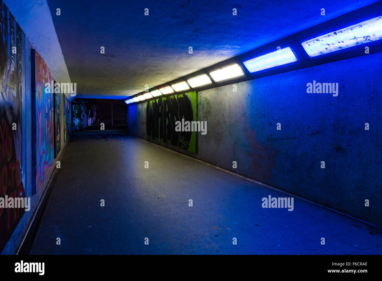 Darkly lit underpass in a city centre Stock Photo - Alamy