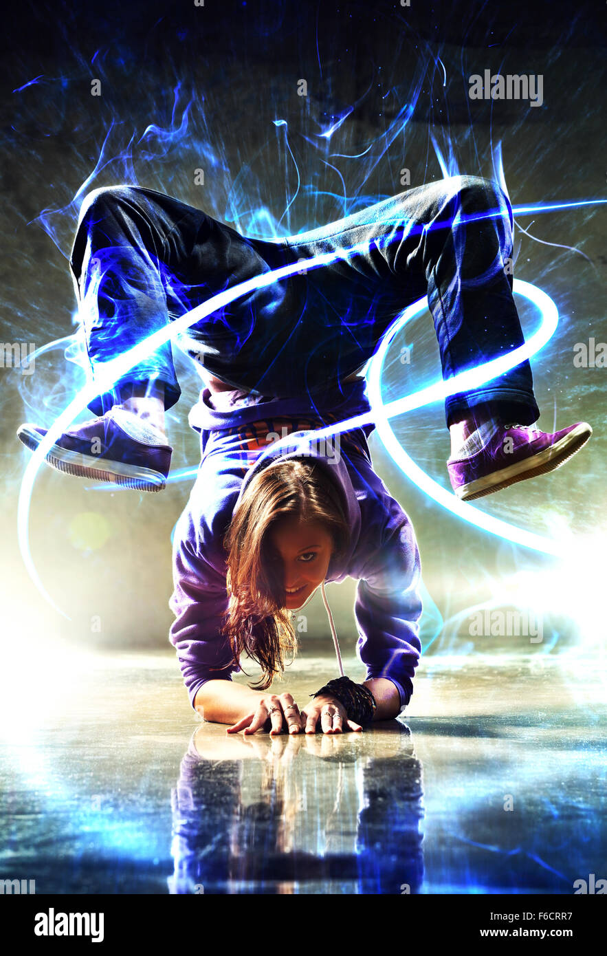 Young woman modern dancer. With lights and glow energy effect Stock ...