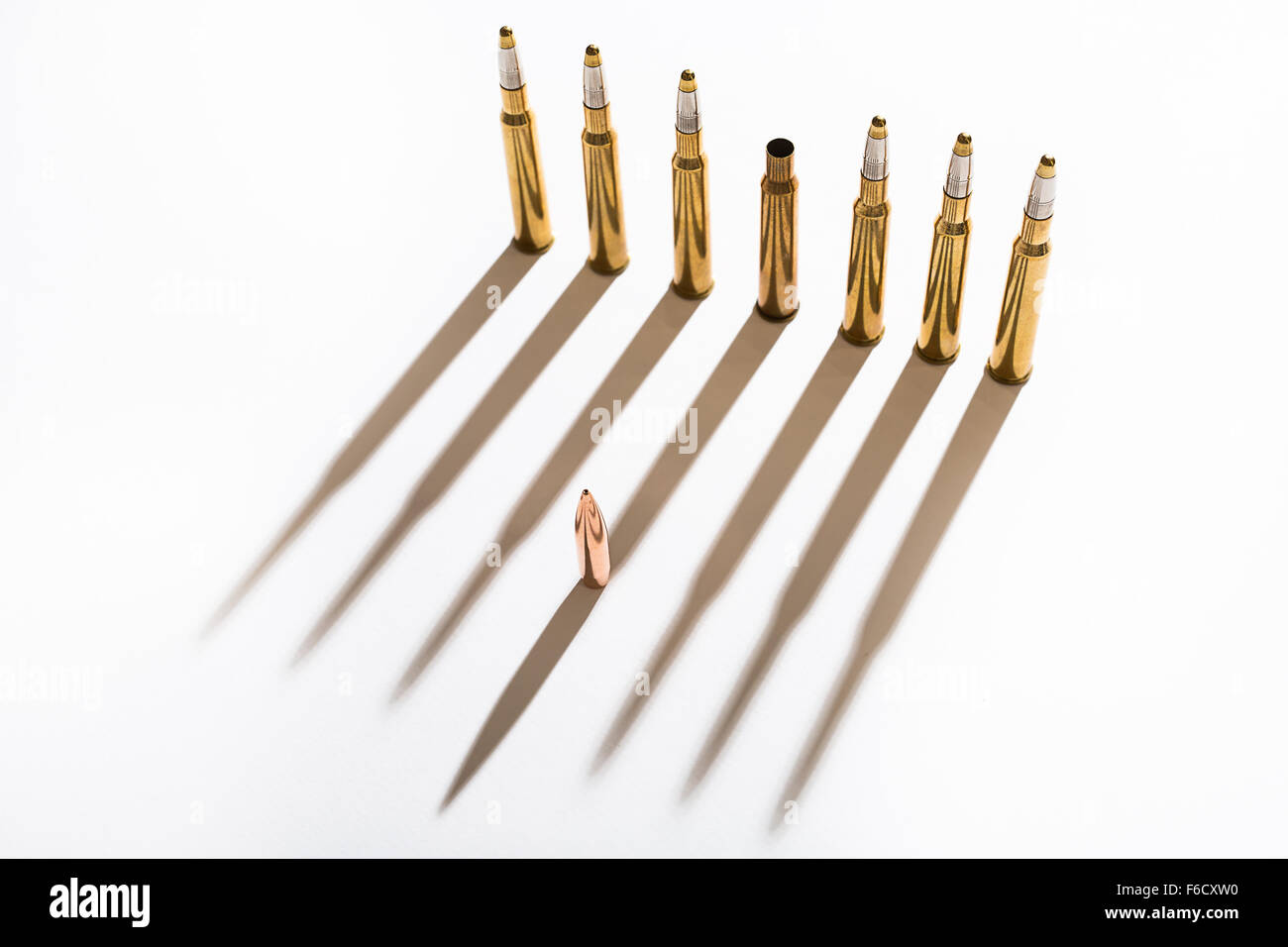 Macro shot of bullet casings on a white studio background Stock Photo ...