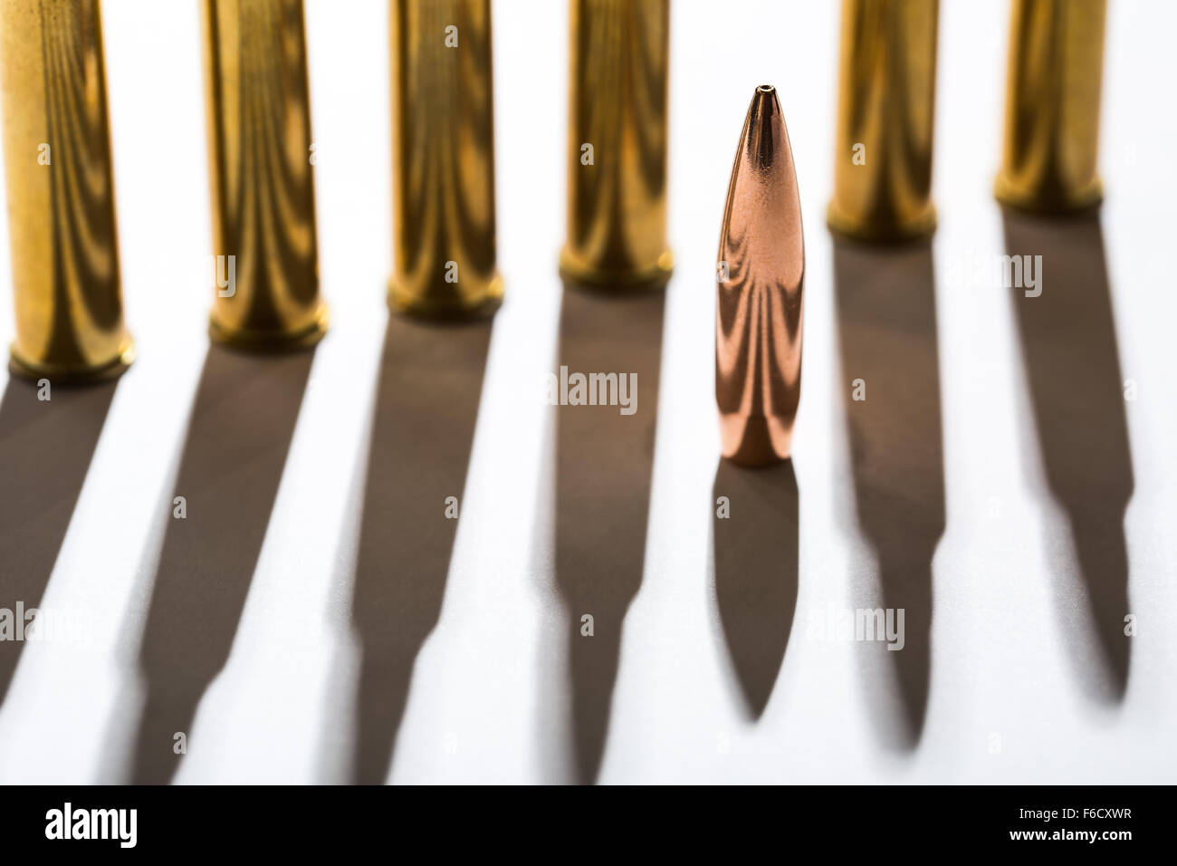 Macro shot of bullet casings on a white studio background Stock Photo ...
