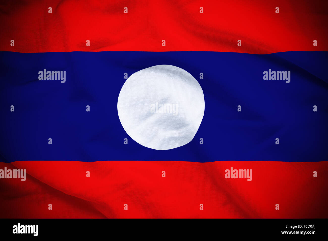 Wavy and rippled national flag of Laos background Stock Photo - Alamy
