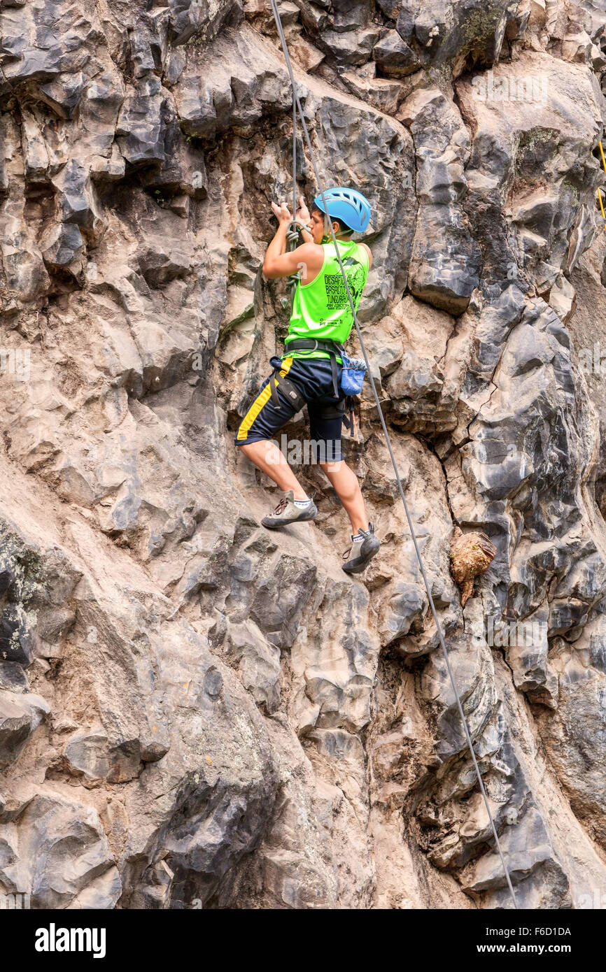 Boy man climbing mountain hi-res stock photography and images - Alamy