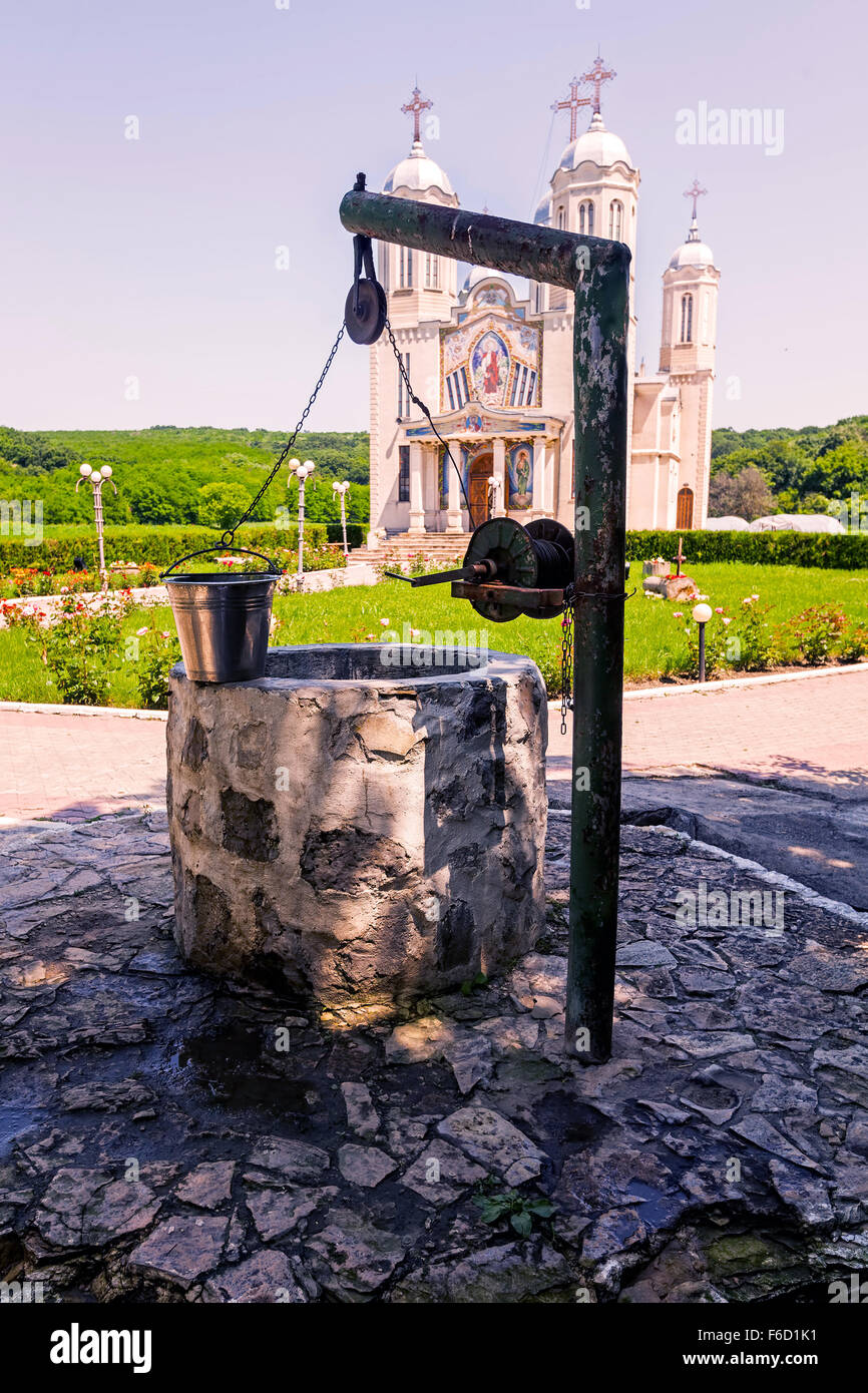 Fountain Of Stone In The Court Of Orthodox Monastery, Romania Stock ...