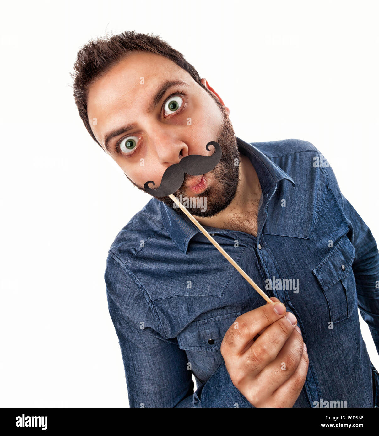 Young man with photo booth shaped mustache on white background Stock ...