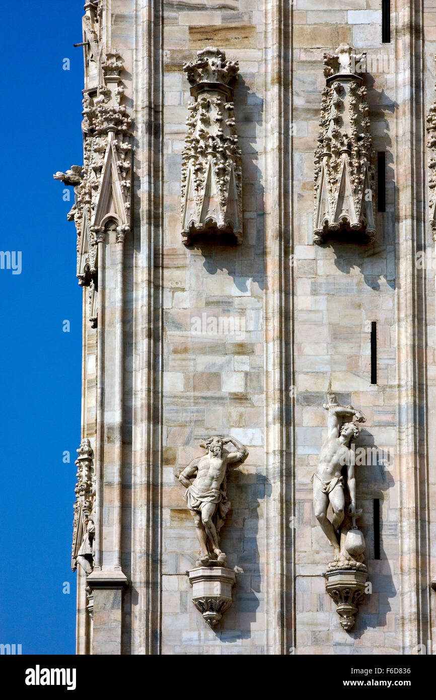 italy statue of a men in the front of the duomo church in milan and sky ...