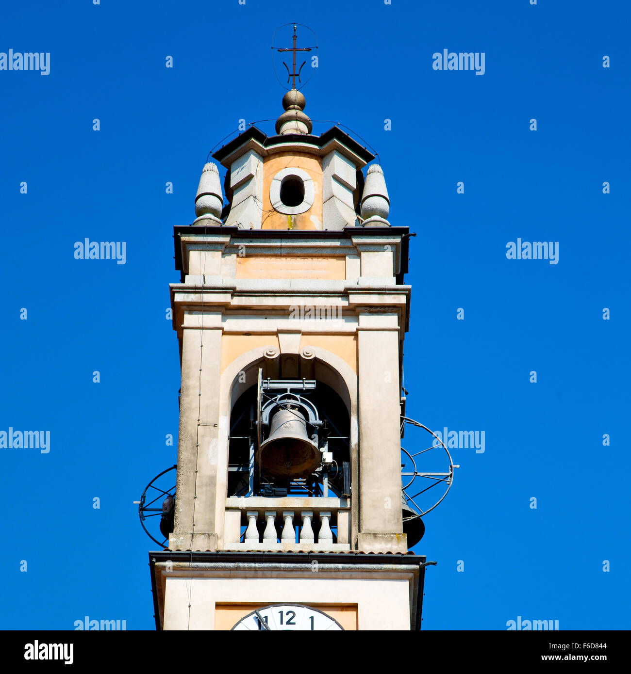 ancien clock tower in italy europe old stone and bell Stock Photo - Alamy