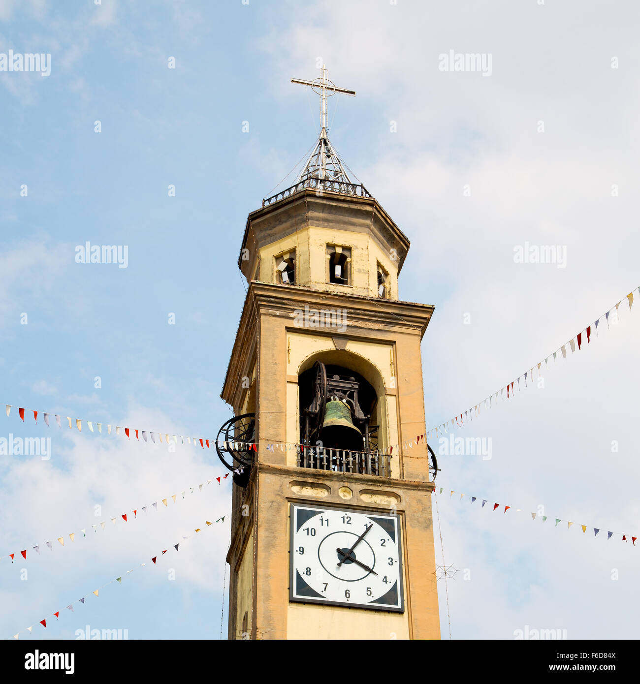 ancien clock tower in italy europe old stone and bell Stock Photo - Alamy
