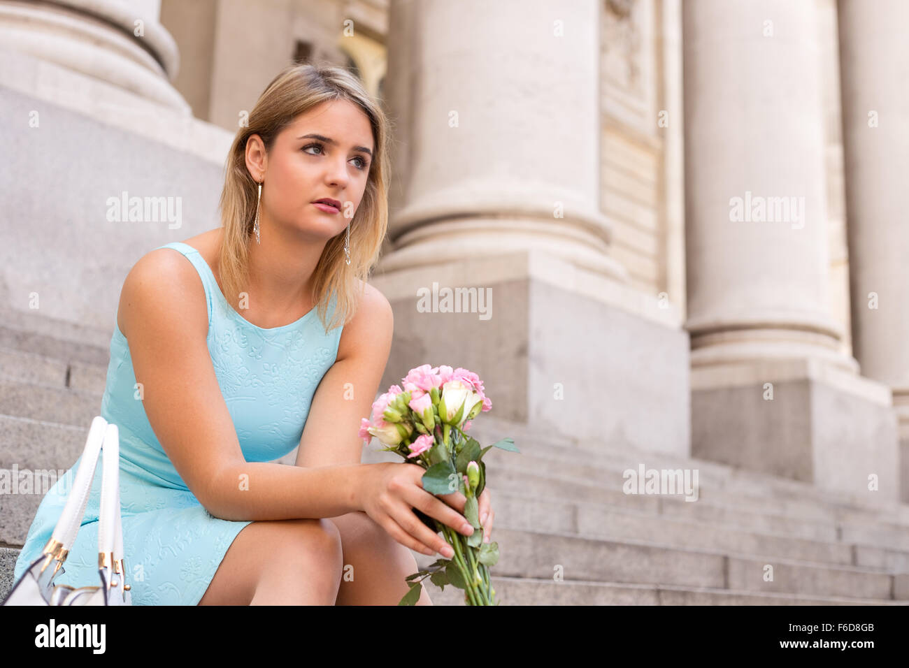 Sad Girl Holding Flower