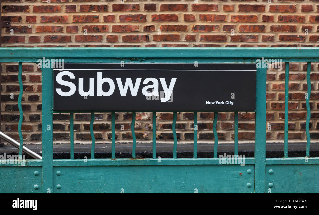 Subway sign in New York City with bricks wall on background Stock Photo ...