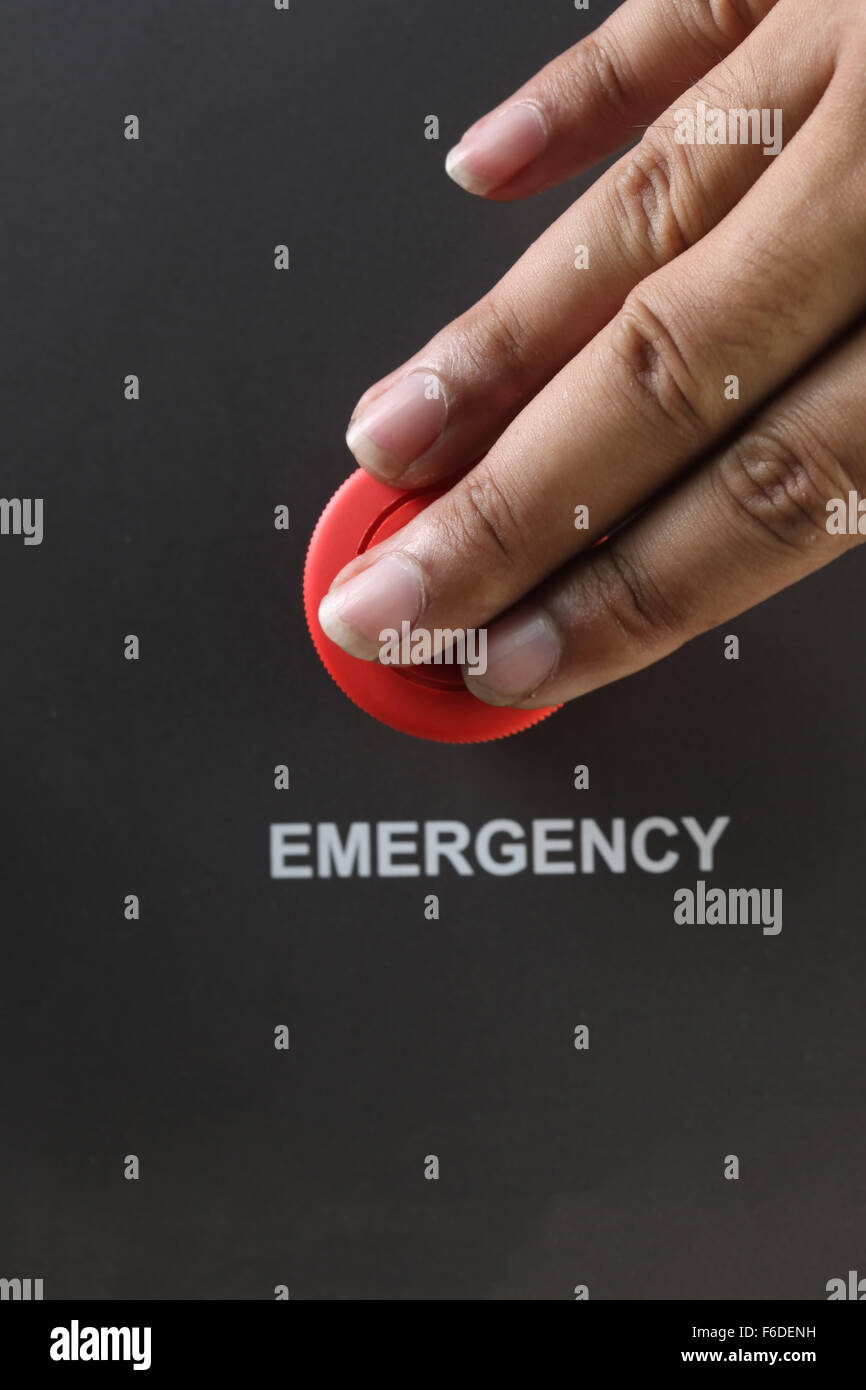 Asian Male hand pushing emergency red button Stock Photo - Alamy