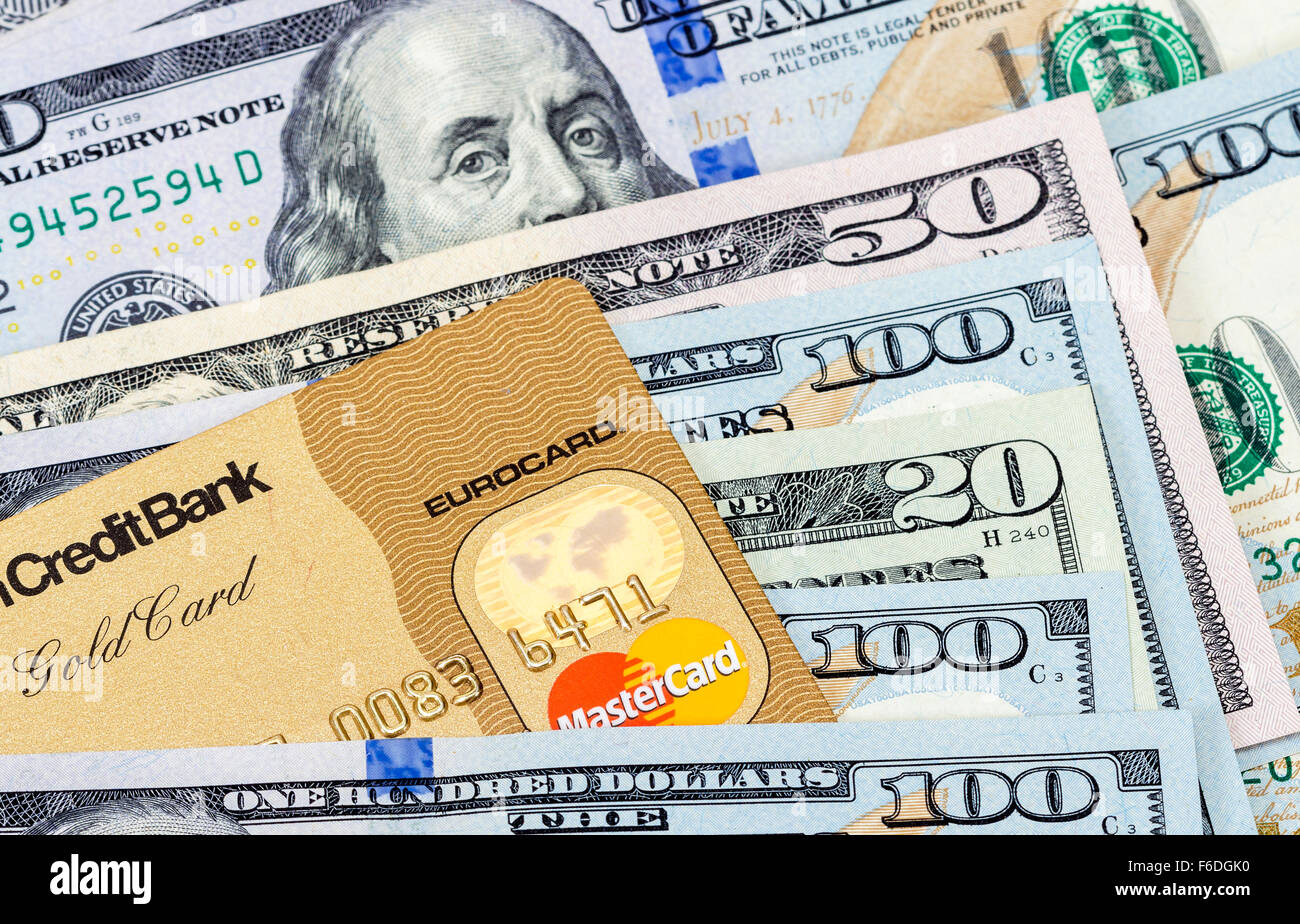 MasterCard Credit Card with American Dollar bills Stock Photo - Alamy