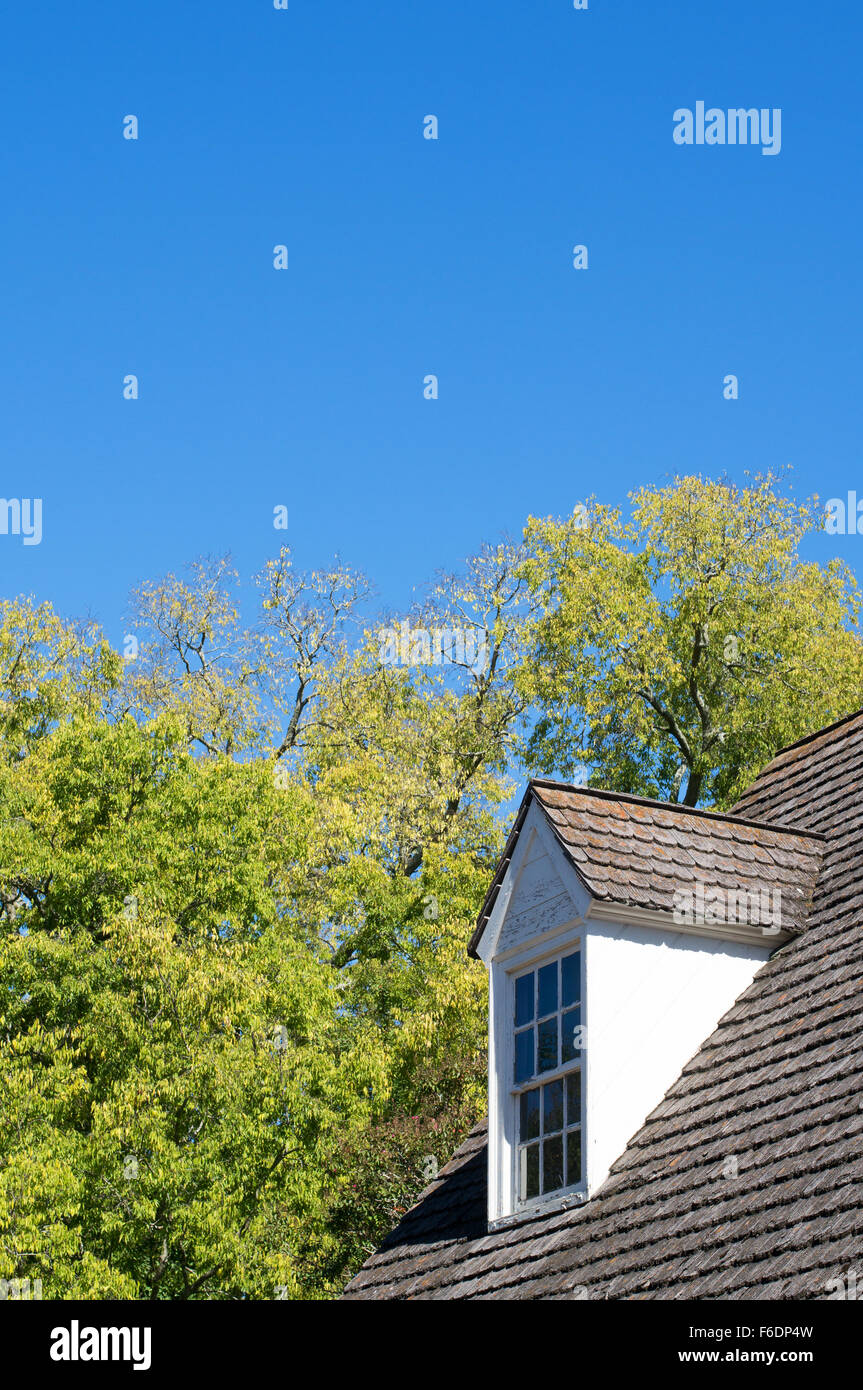 Building detail dormer window and wooden shingles, Colonial ...