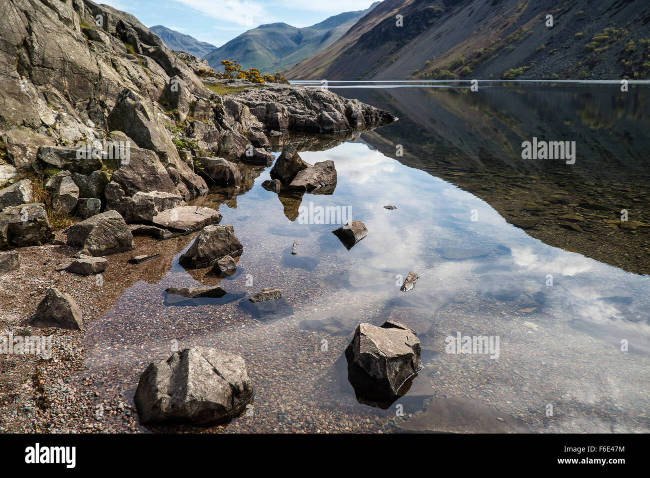 Stunning landscape of Wast Water with mountains reflected in calm lake ...