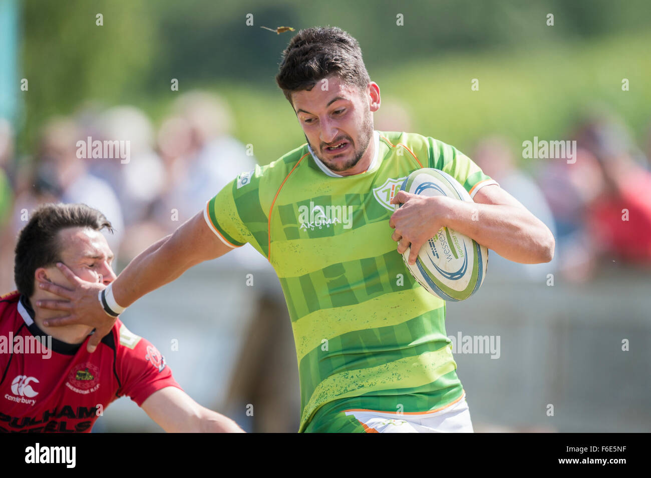 Rugby player in action Stock Photo - Alamy