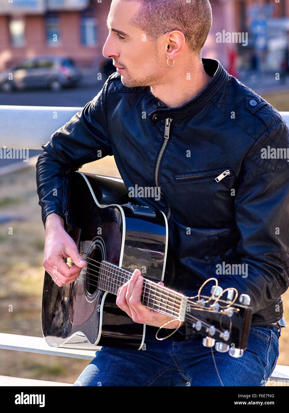 Music street performers guitarist playing guitar Stock Photo - Alamy
