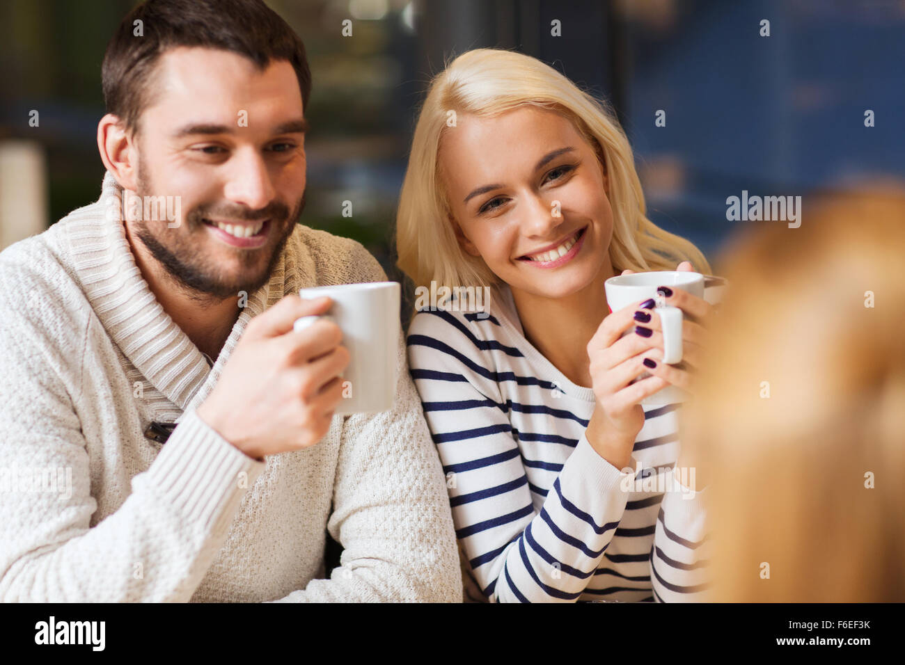 happy couple meeting and drinking tea or coffee Stock Photo - Alamy