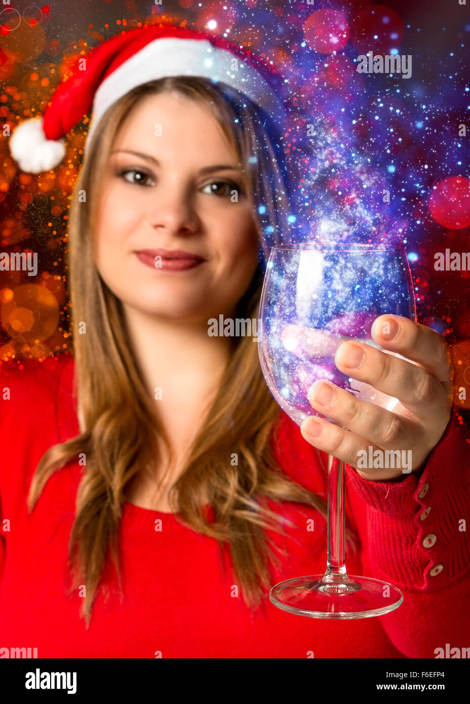 girl toast with glass for Christmas Stock Photo - Alamy