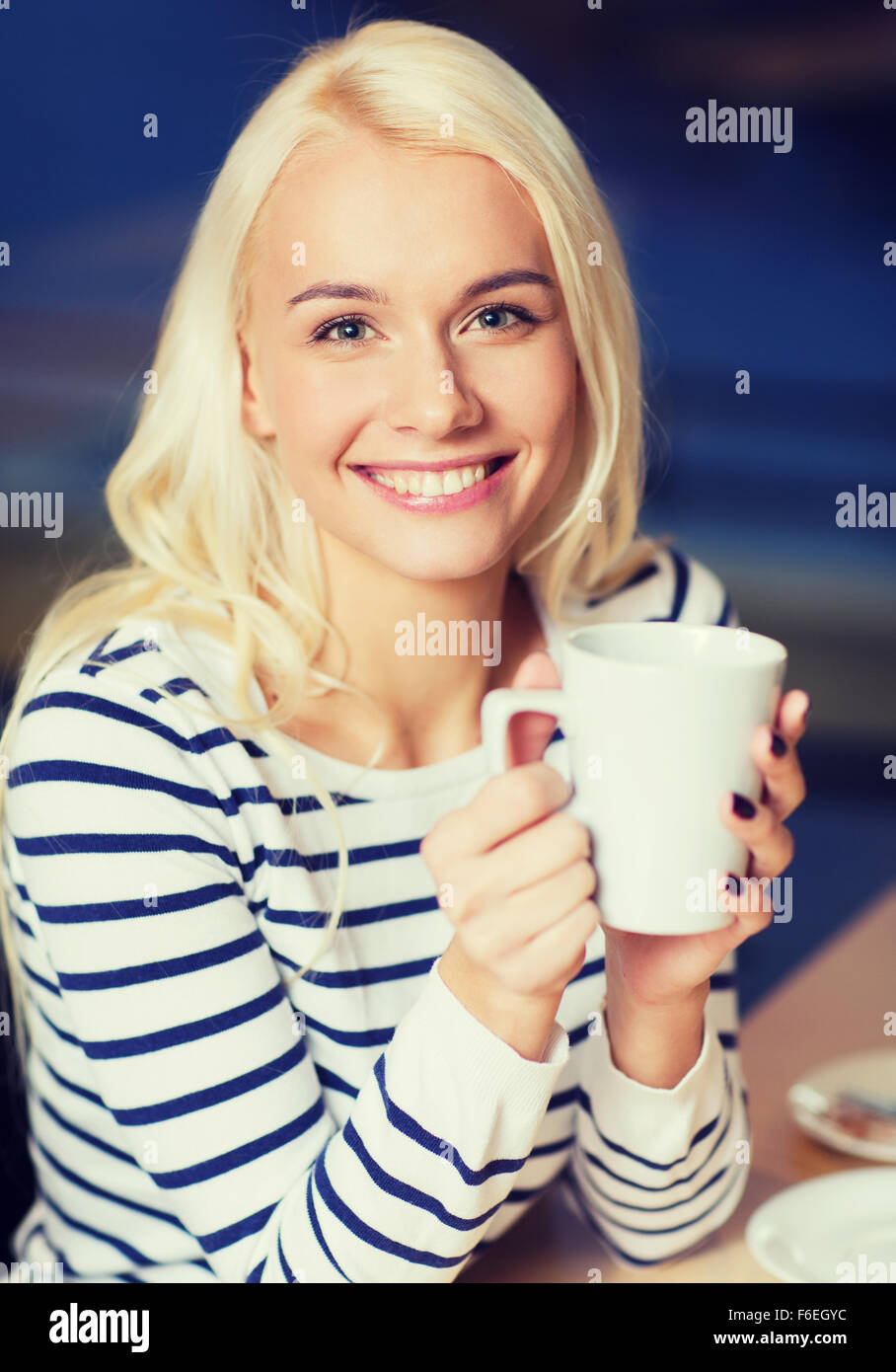 Woman and drinking coffee and cafe hi-res stock photography and images ...
