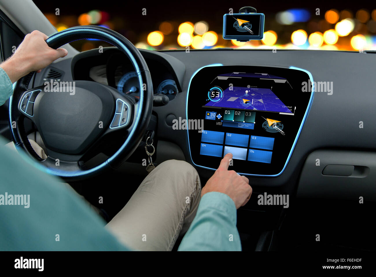 close up of man driving car with navigation system Stock Photo - Alamy