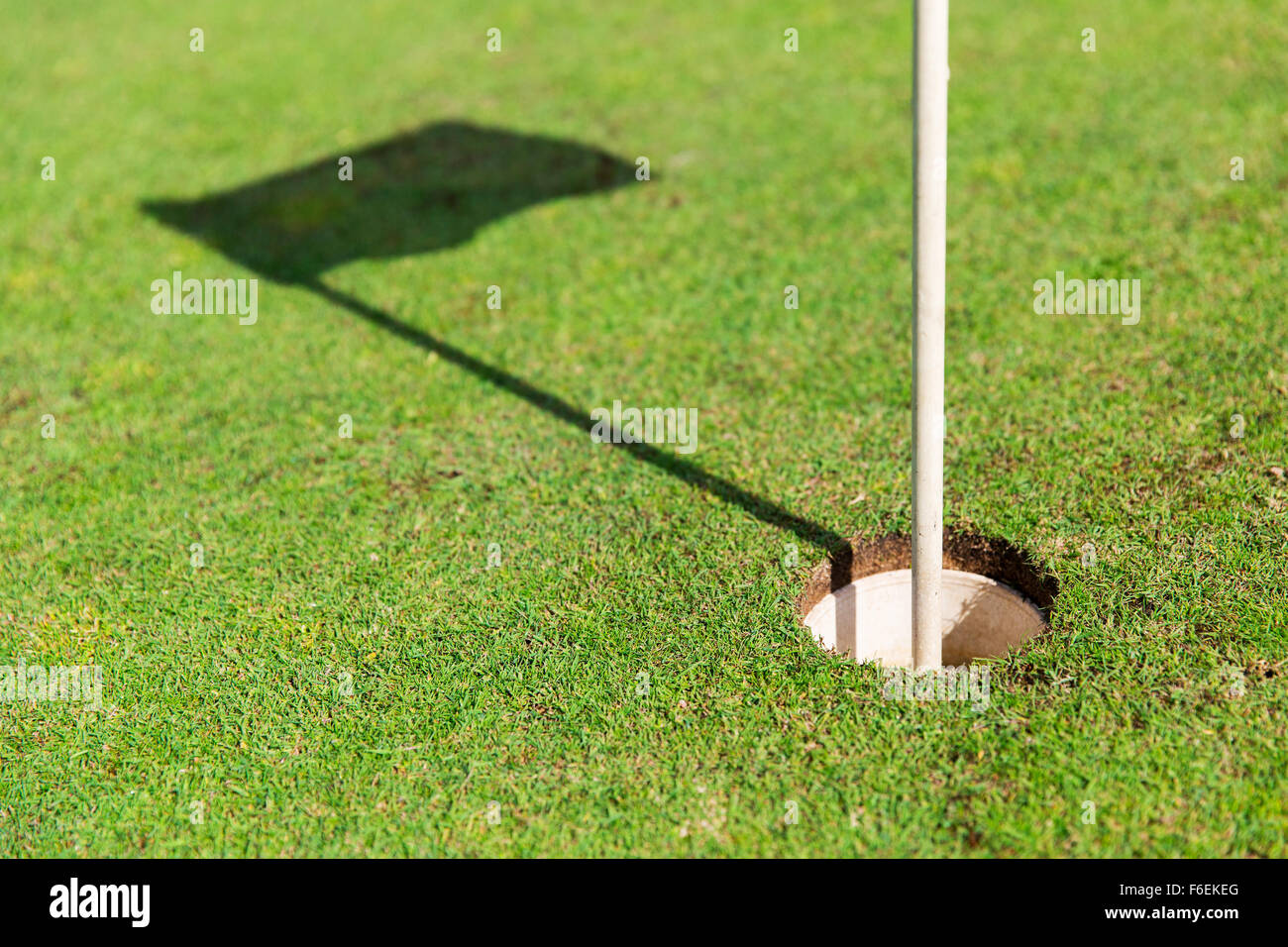 Shadow of golf flag hi-res stock photography and images - Alamy