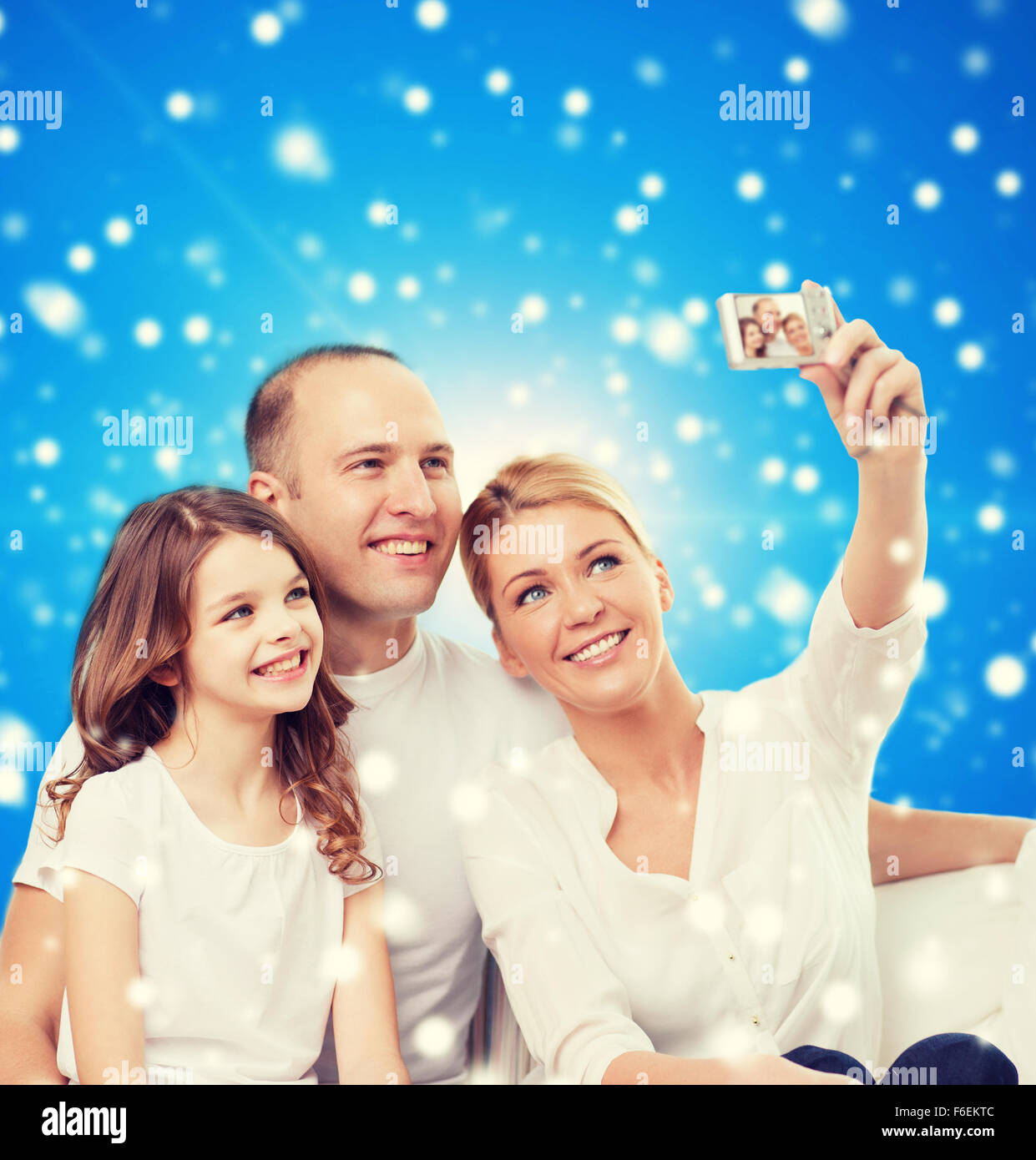 happy family with camera at home Stock Photo - Alamy