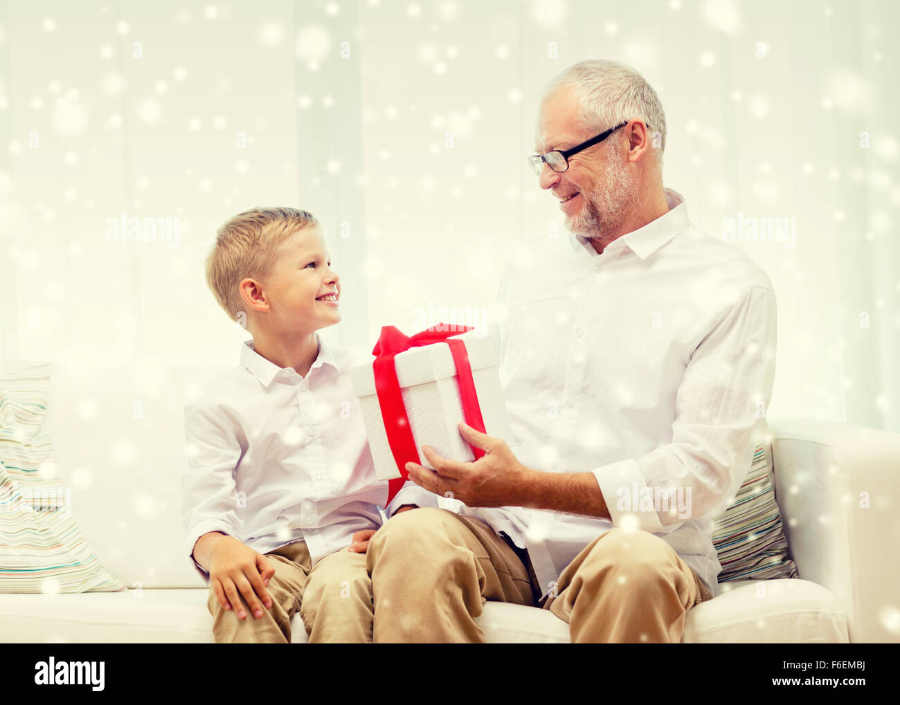 smiling grandfather and grandson at home Stock Photo - Alamy