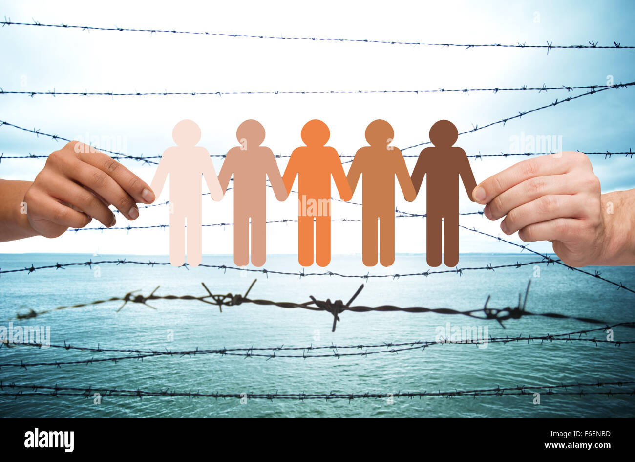 Person holding barbed wire fence barbed wire hi-res stock photography ...