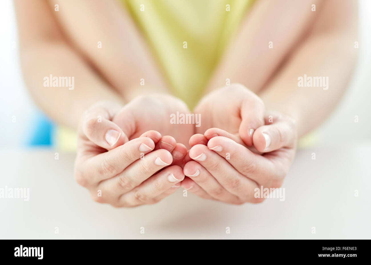 Hands cupped together hi-res stock photography and images - Alamy