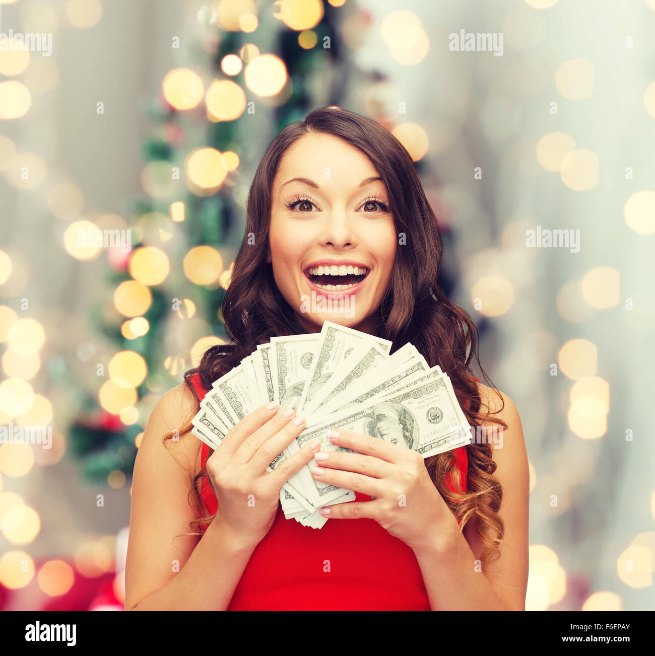 woman in red dress with us dollar money Stock Photo - Alamy