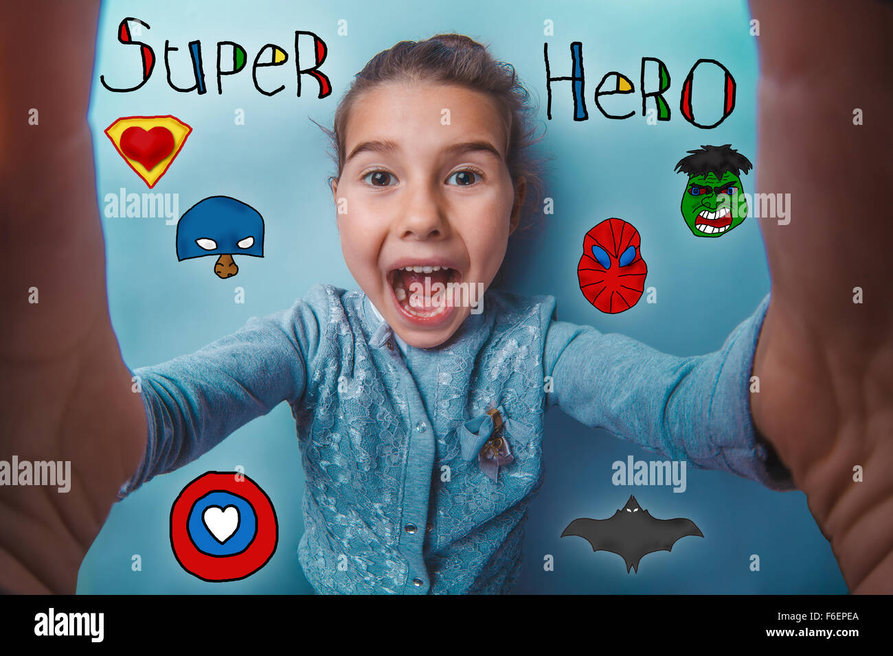 Selfe joy girl opened her mouth super hero super power at the ph Stock ...