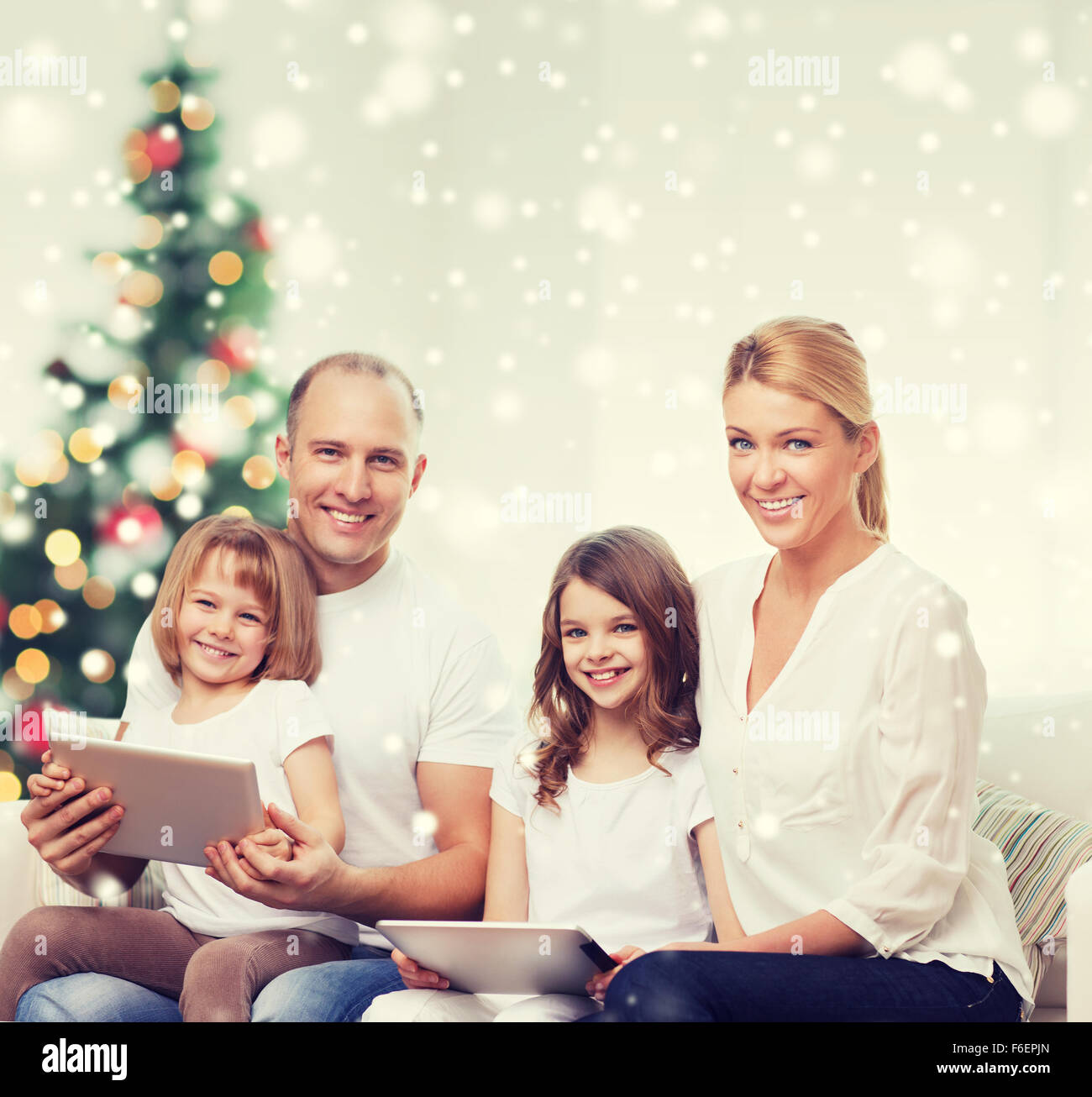 happy family with tablet pc computers at home Stock Photo - Alamy