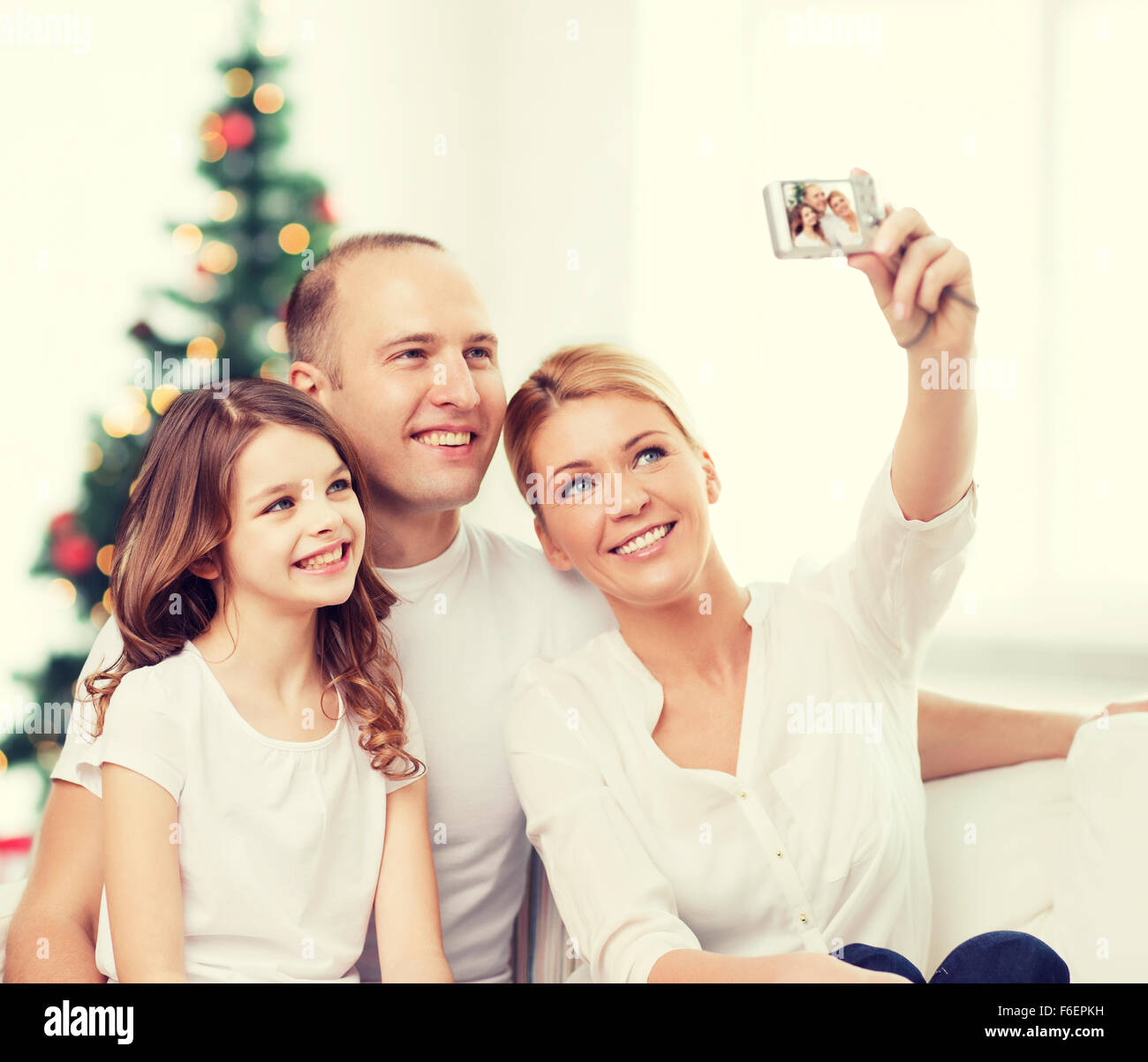 happy family with camera at home Stock Photo - Alamy
