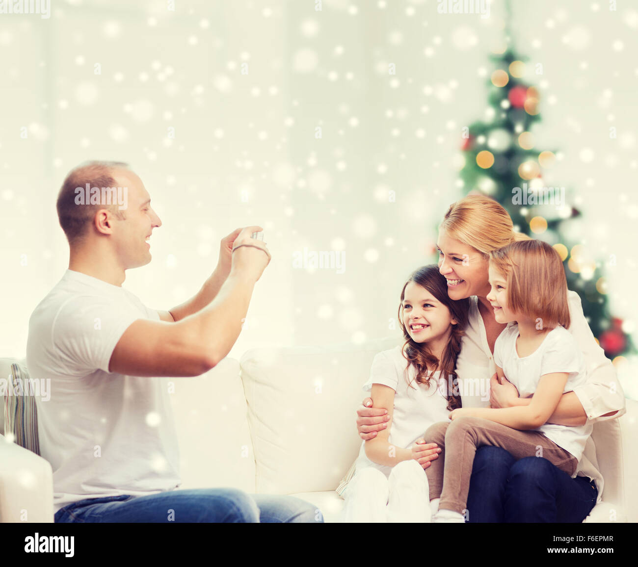 happy family with camera at home Stock Photo - Alamy