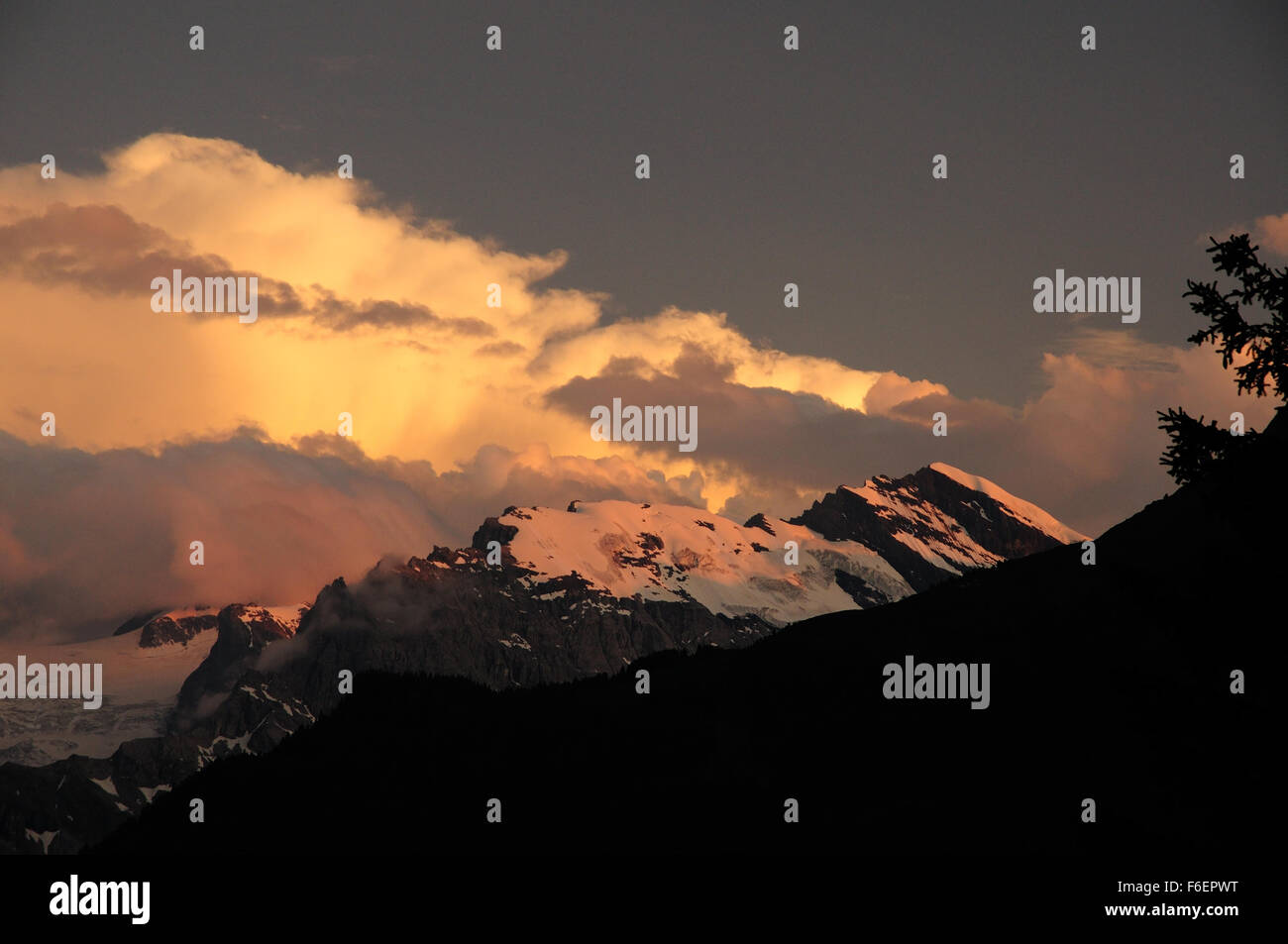 Late evening sunshine over the Bernese Alps Stock Photo - Alamy