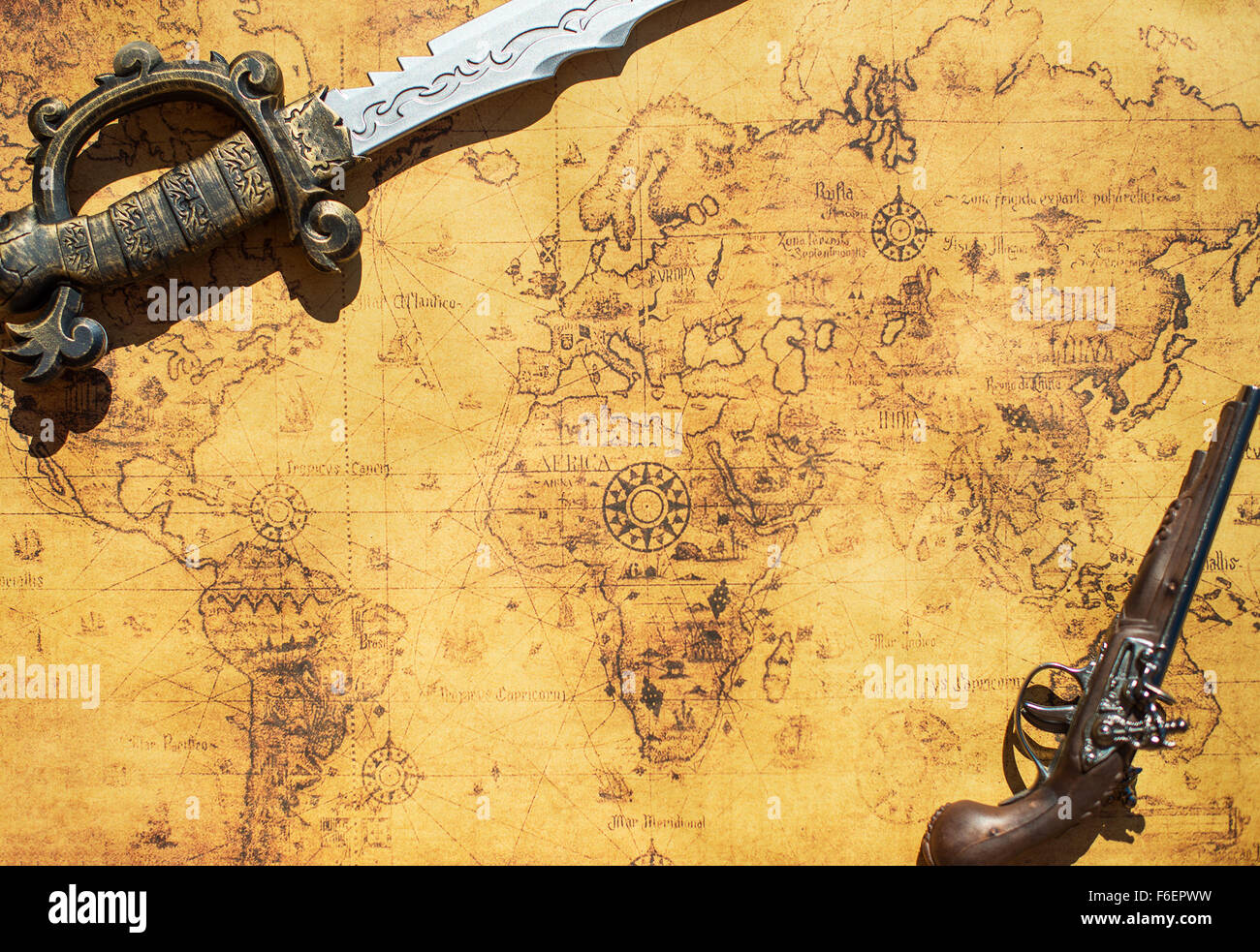 Old treasure map with sword and musket gun Stock Photo - Alamy
