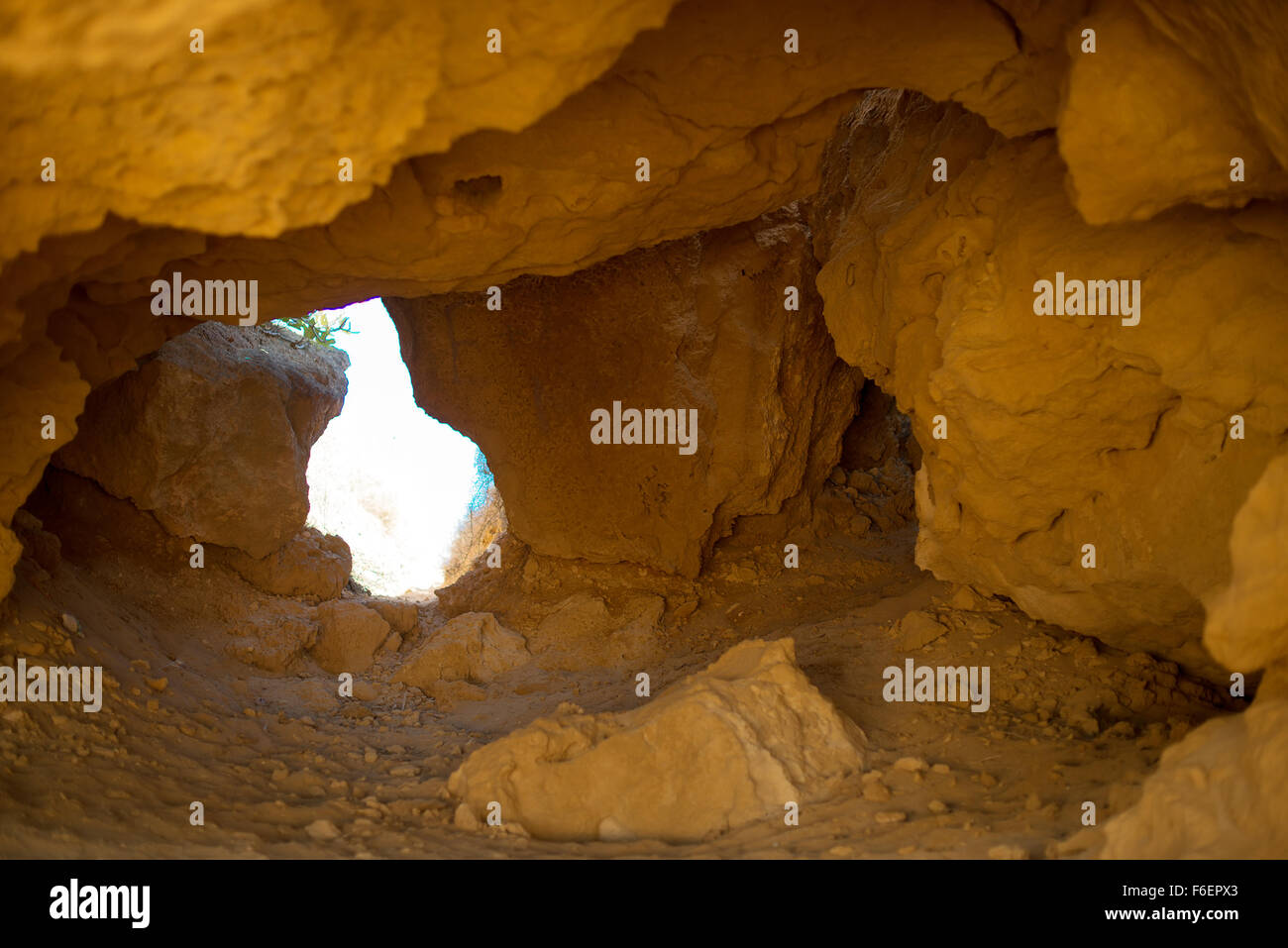 Ancient cave exit Stock Photo - Alamy