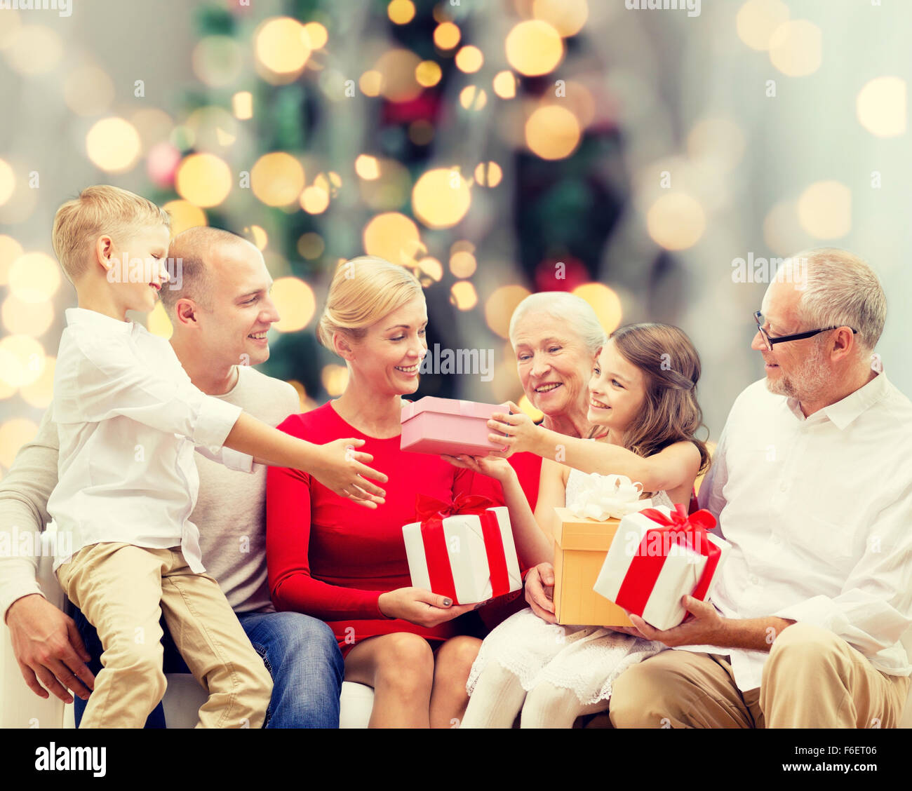 smiling family with gifts Stock Photo - Alamy